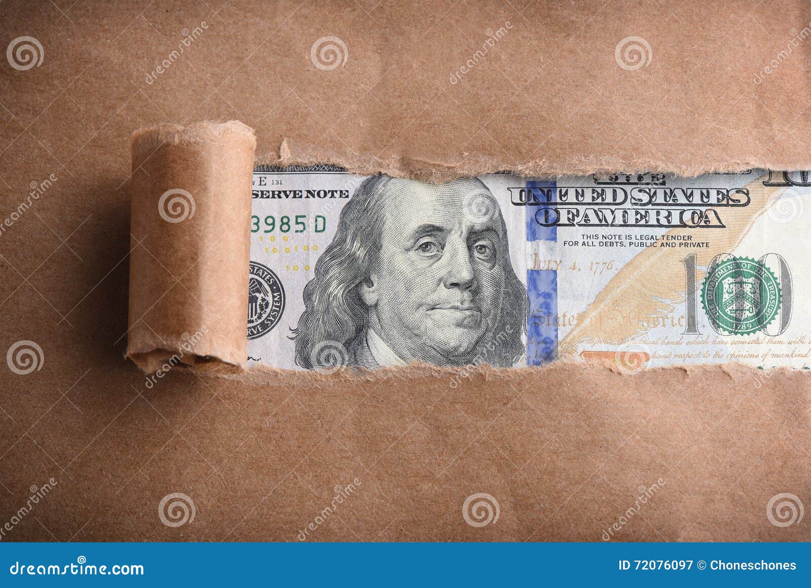 Money through torn paper stock image. Image of composition - 72076097