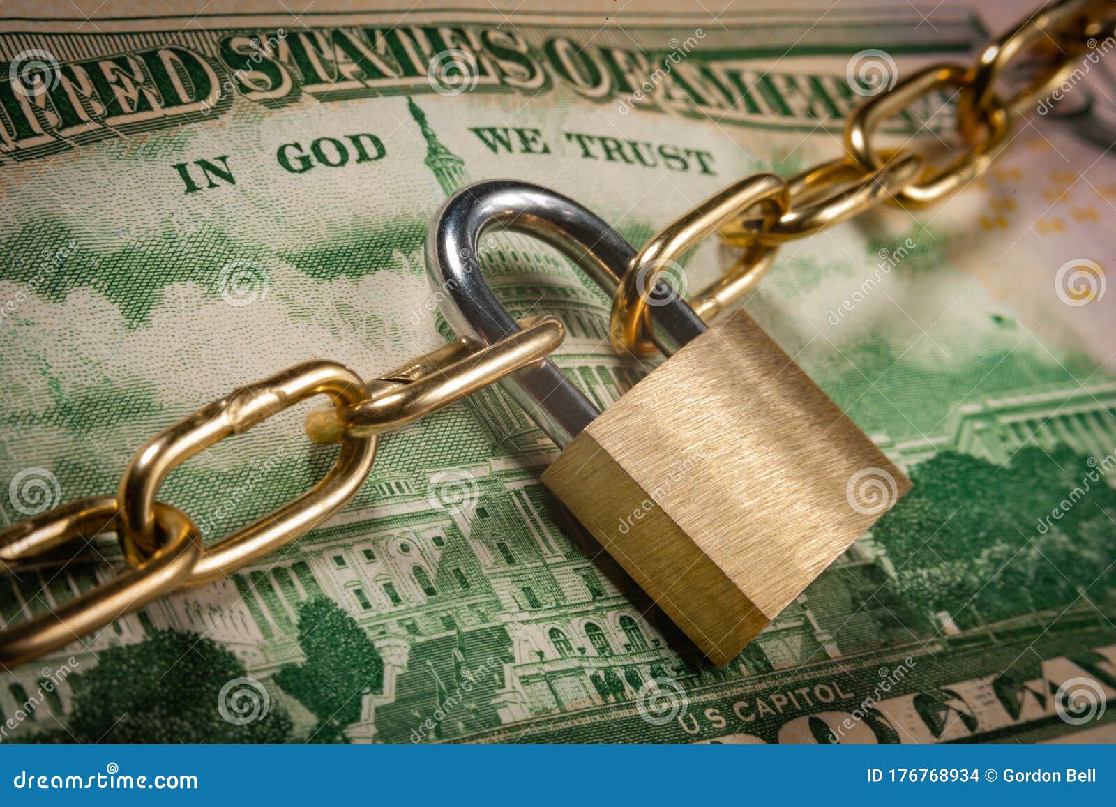 Money under lock and key stock photo. Image of lock - 176768934