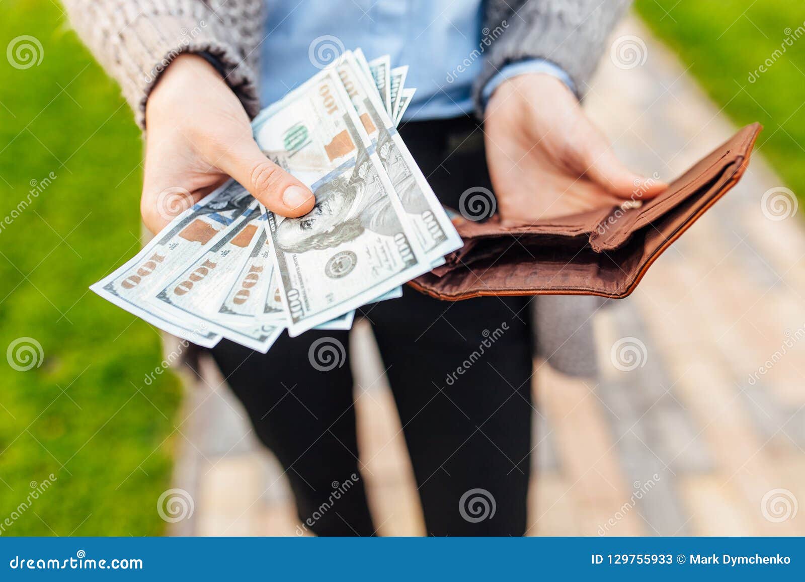 Money in Your Wallet. the Person Pulls Money Out of His Wallet a Stock ... Money in Your Wallet. the Person Pulls Money Out of His Wallet a Stock ...