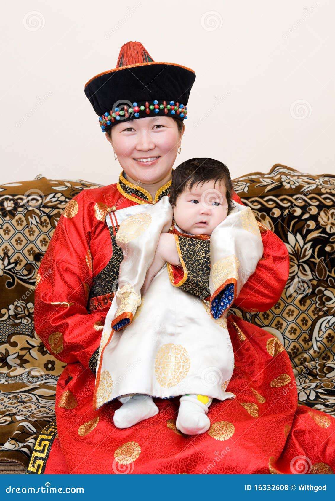 Mongolian woman with baby stock photo. Image of carpet - 16332608