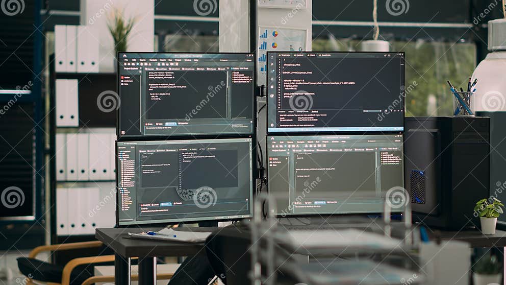 Monitors Displaying Parsing Code in Empty it Agency Office Desk with Computers Stock Image ...