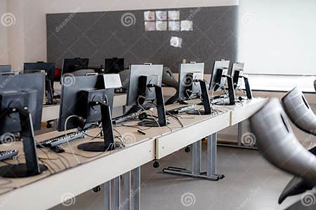 Monitors and Keyboard in an Empty Computer Lab at a Secondary School Stock Photo - Image of ...