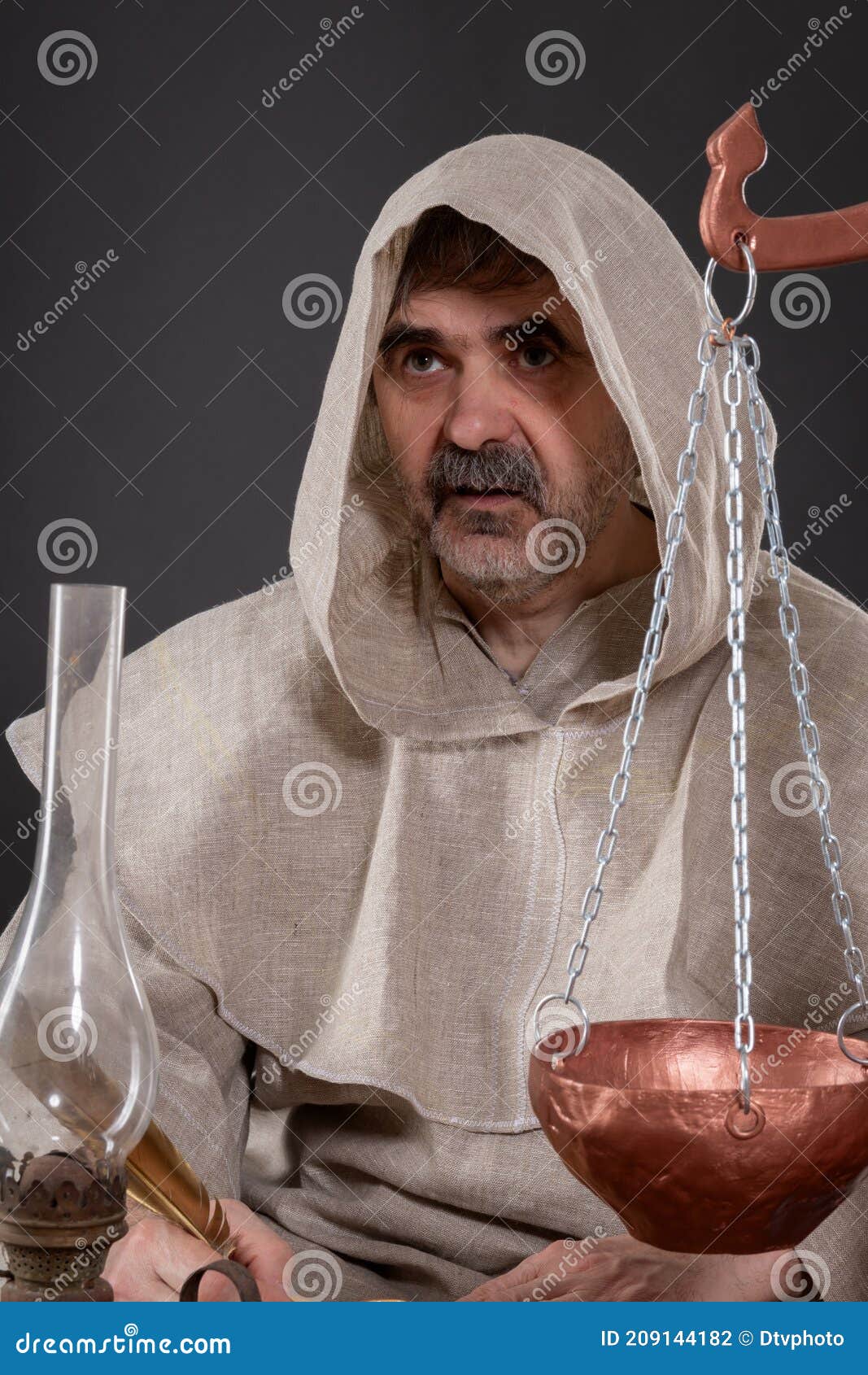 A Monk Alchemist is Engaged in Science Writing Ancient Manuscripts on ...