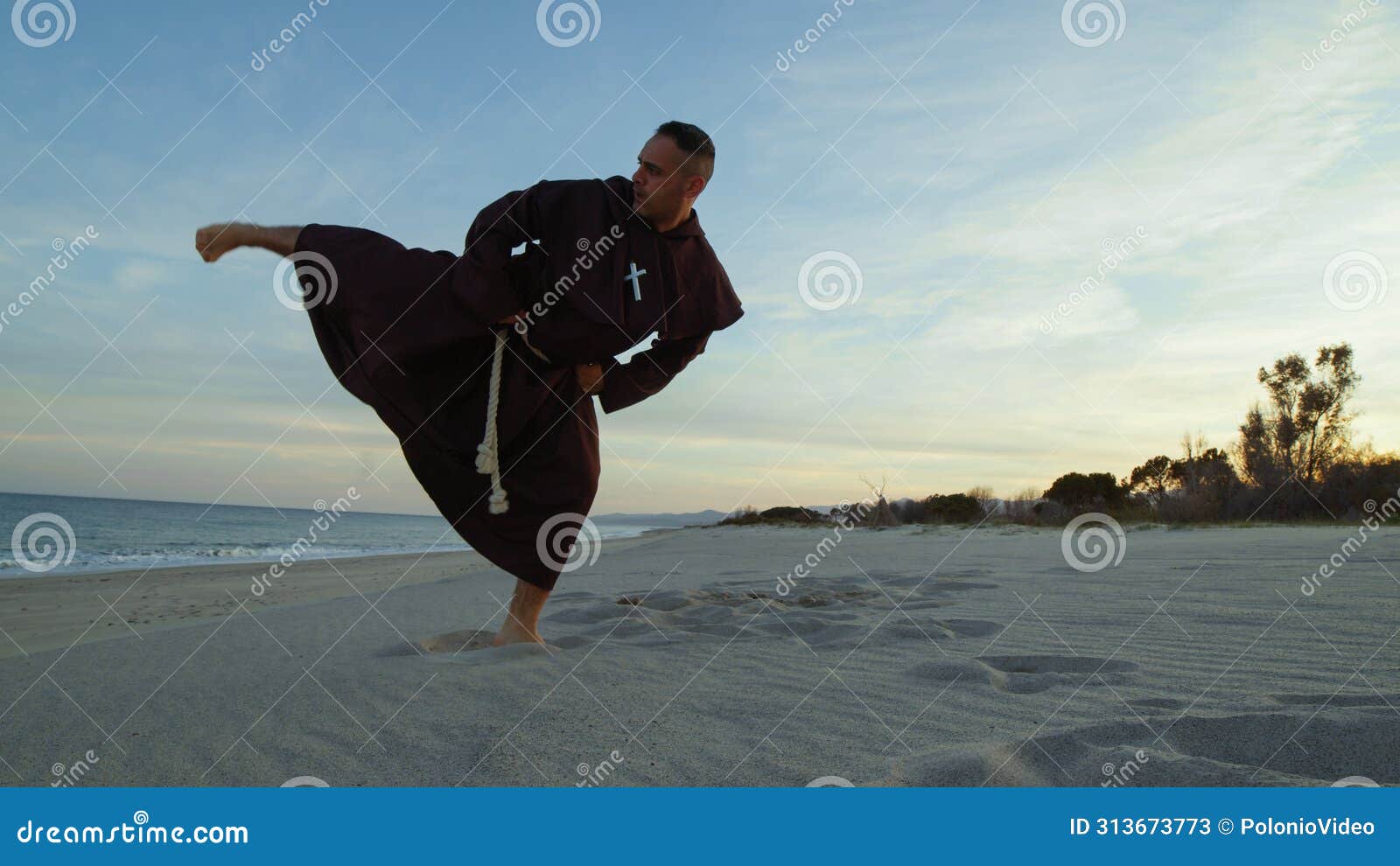Monk Athlete from a Karate Kick in the Beach Stock Image - Image of ...