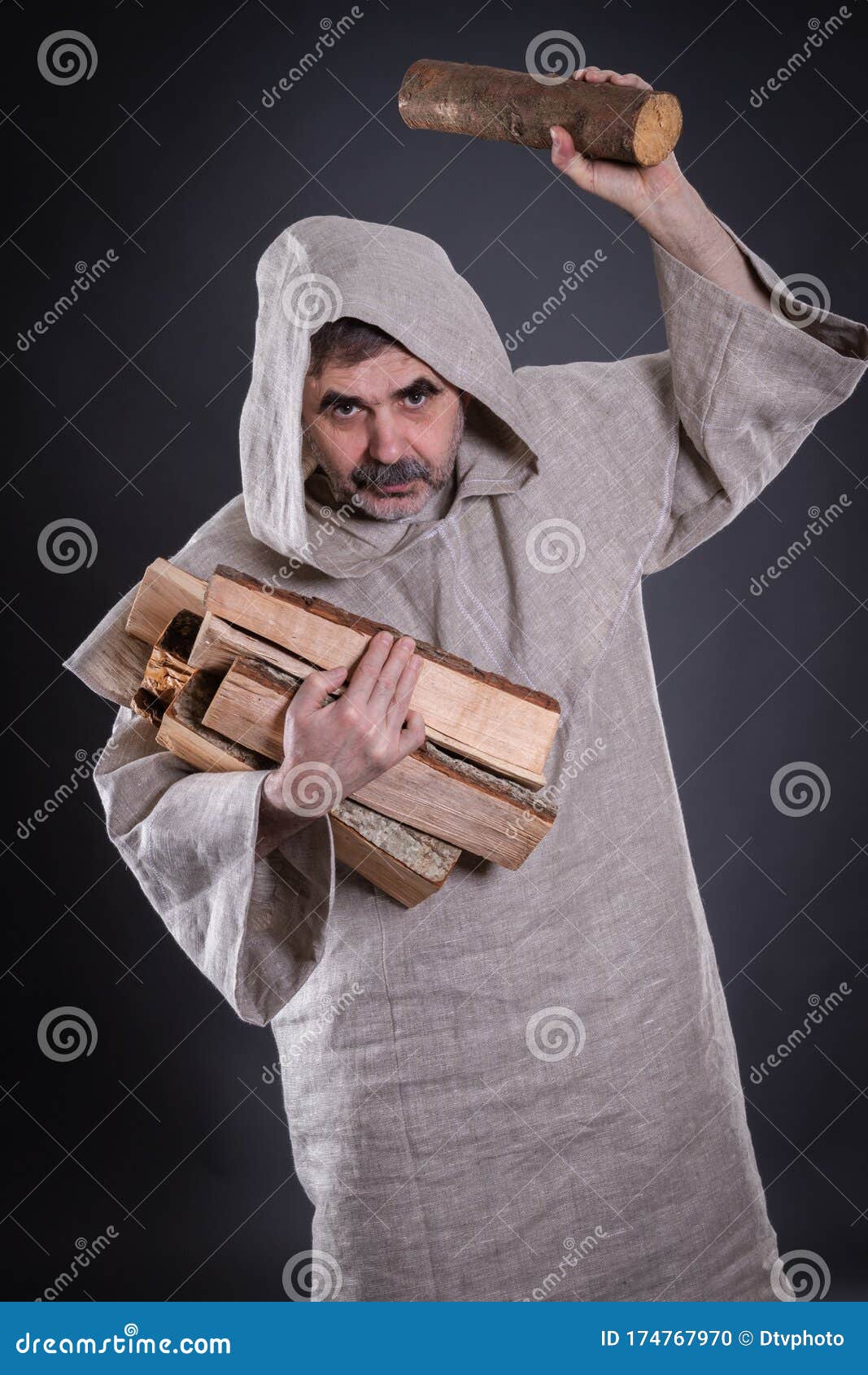 Monk Carrying Firewood Threaten with Chock for Throw Stock Photo ...