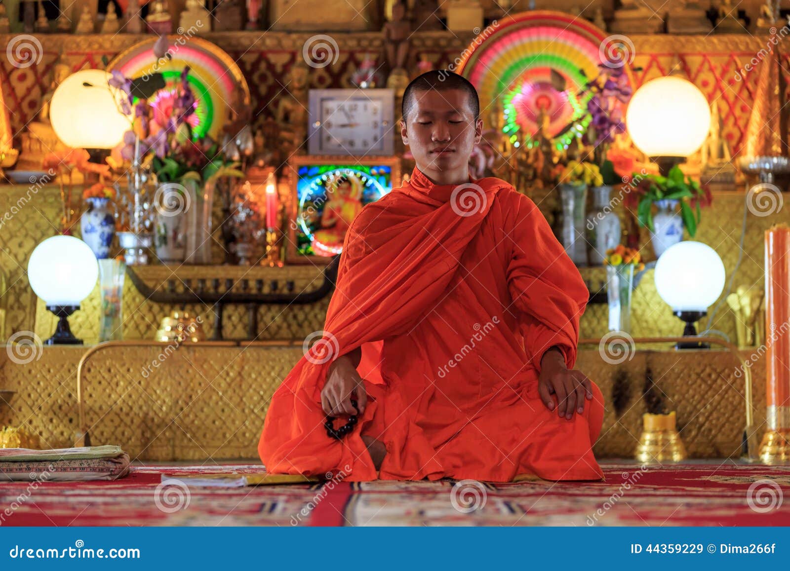 A Monk Meditating in the Lotus Position Stock Image - Image of saffron ...