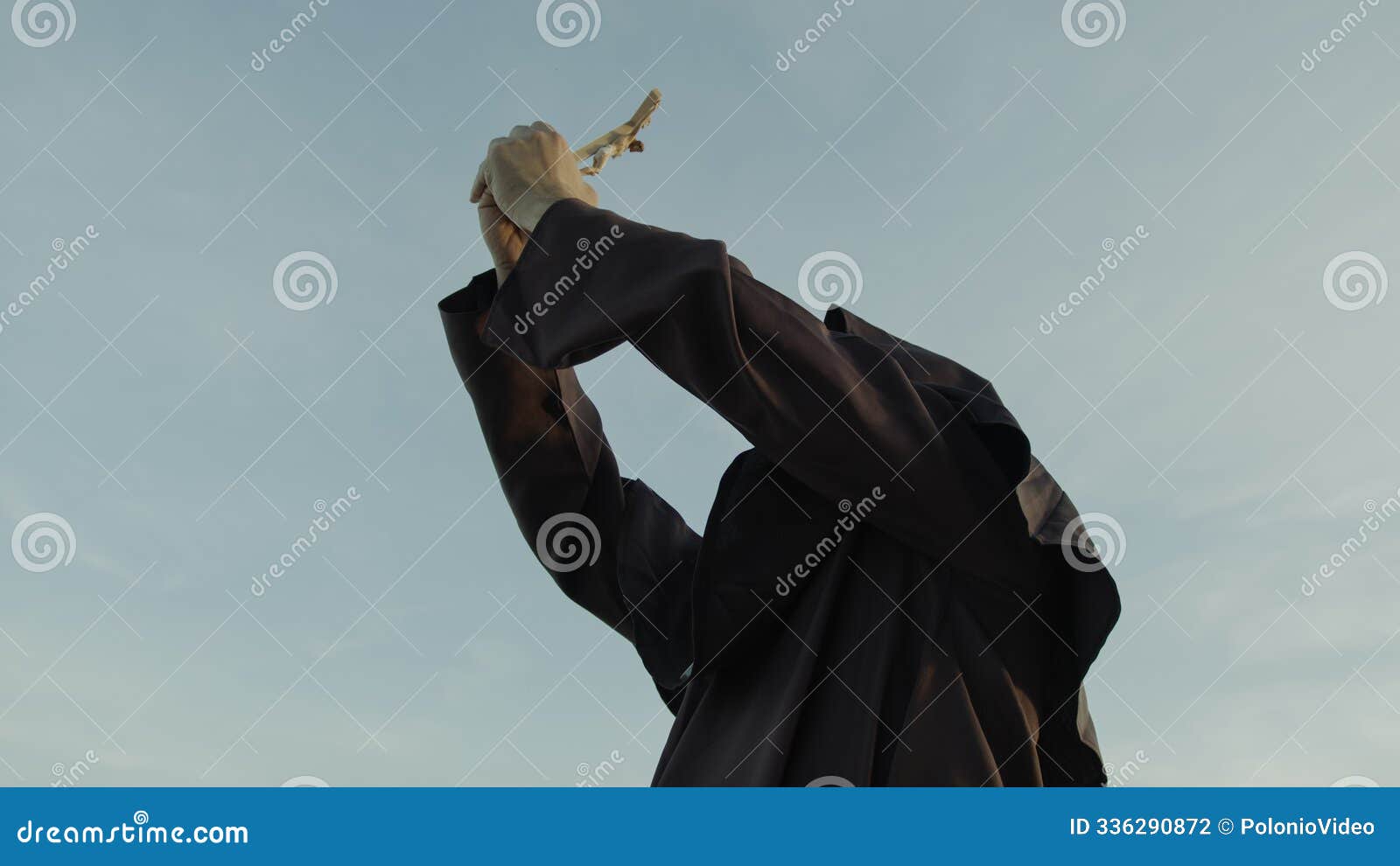 Monk Prays with a Crucifix of Jesus in His Hand Towards the Celestial ...