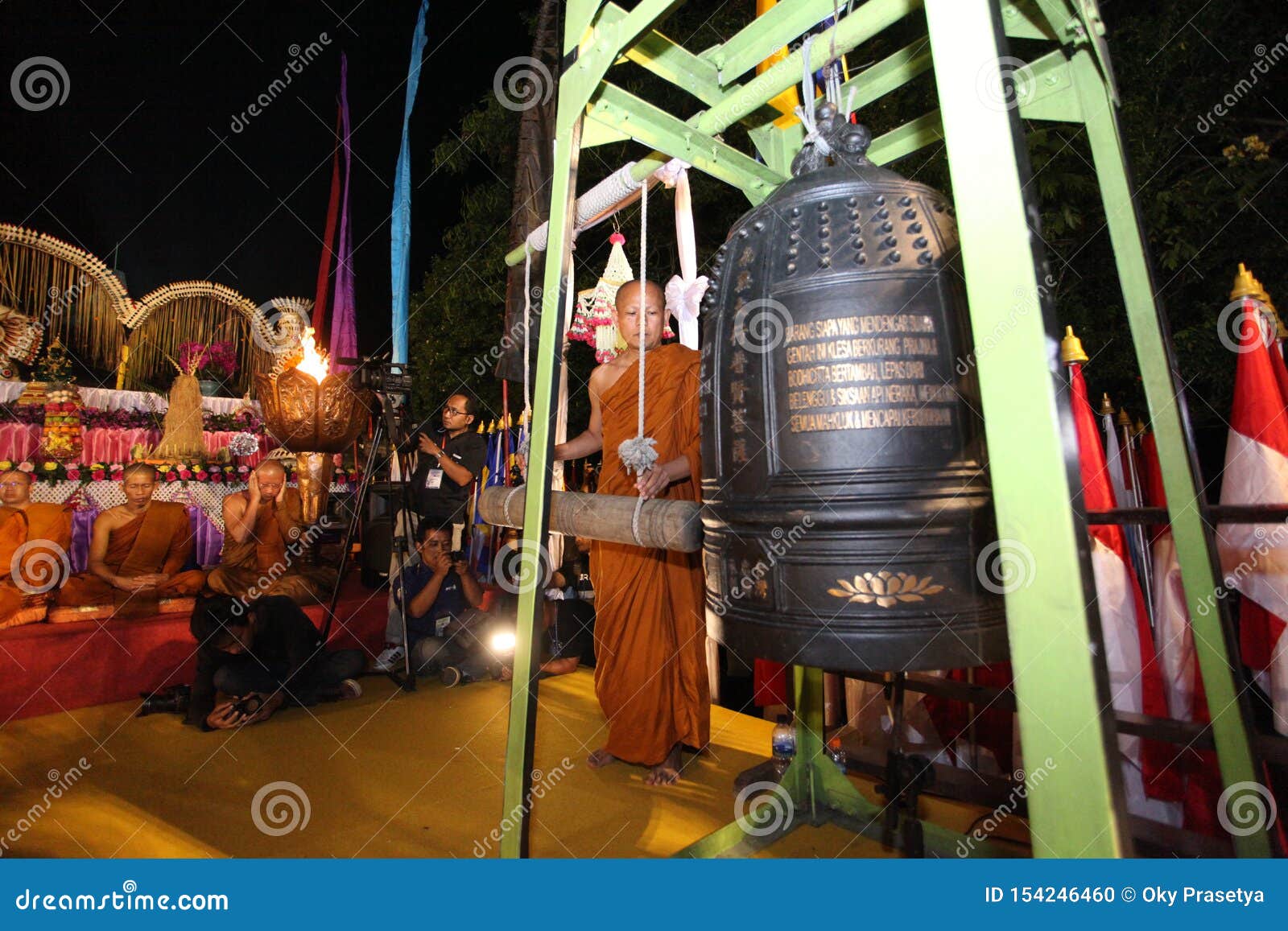 Monk Ring a Big Bell in Borobudur Temple Vesak Day Editorial Image ...