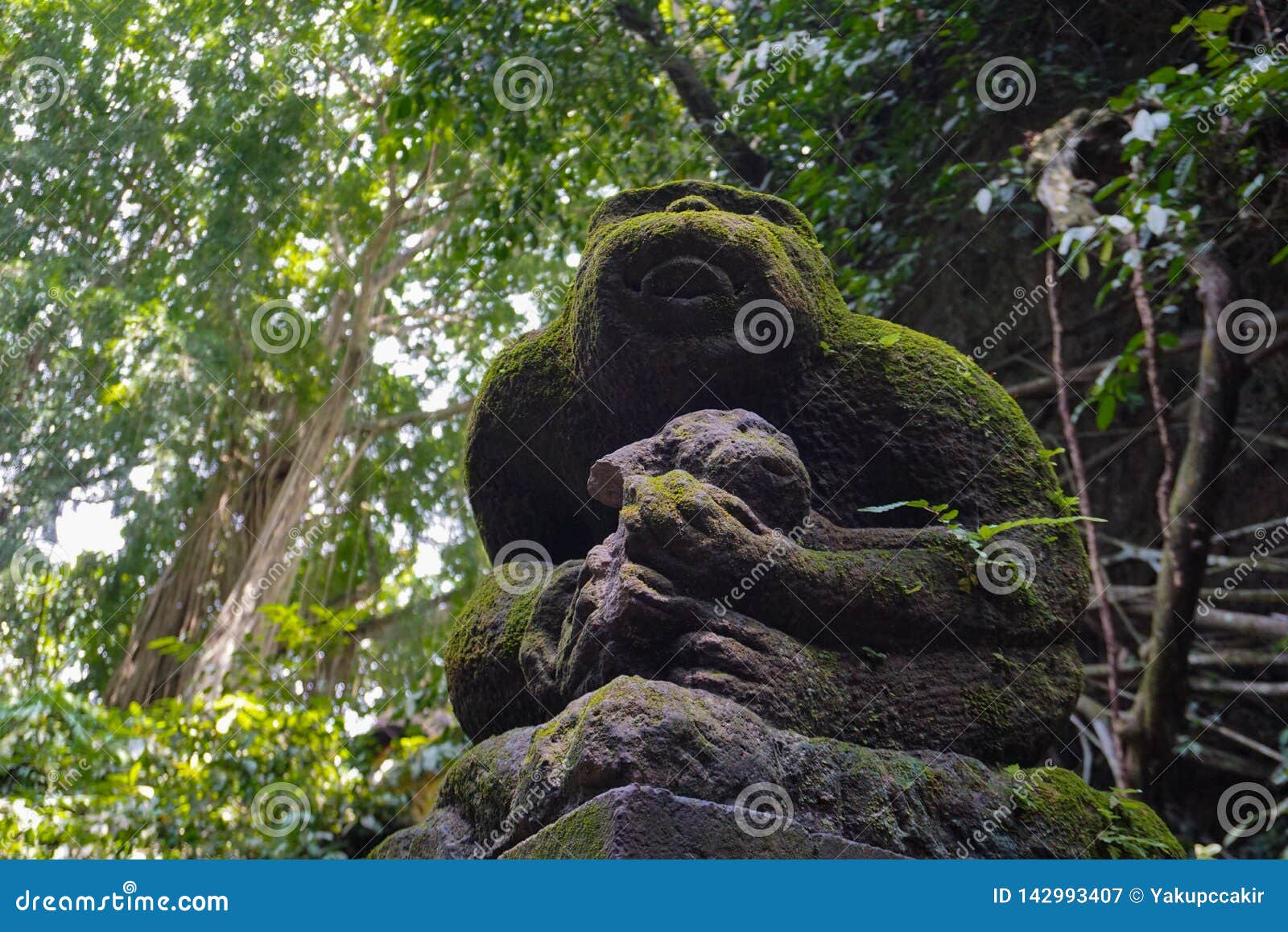 Monkey Statue in Bali Covered with Moss Stock Image - Image of ...