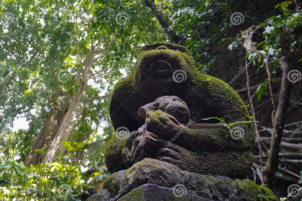 Monkey Statue in Bali Covered with Moss Stock Image - Image of ...