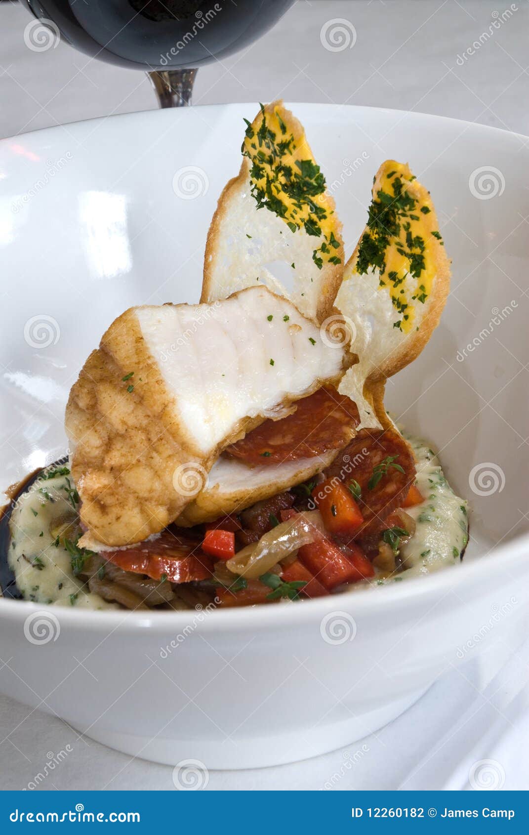 Monkfish entree with wine stock photo. Image of pepperoni - 12260182