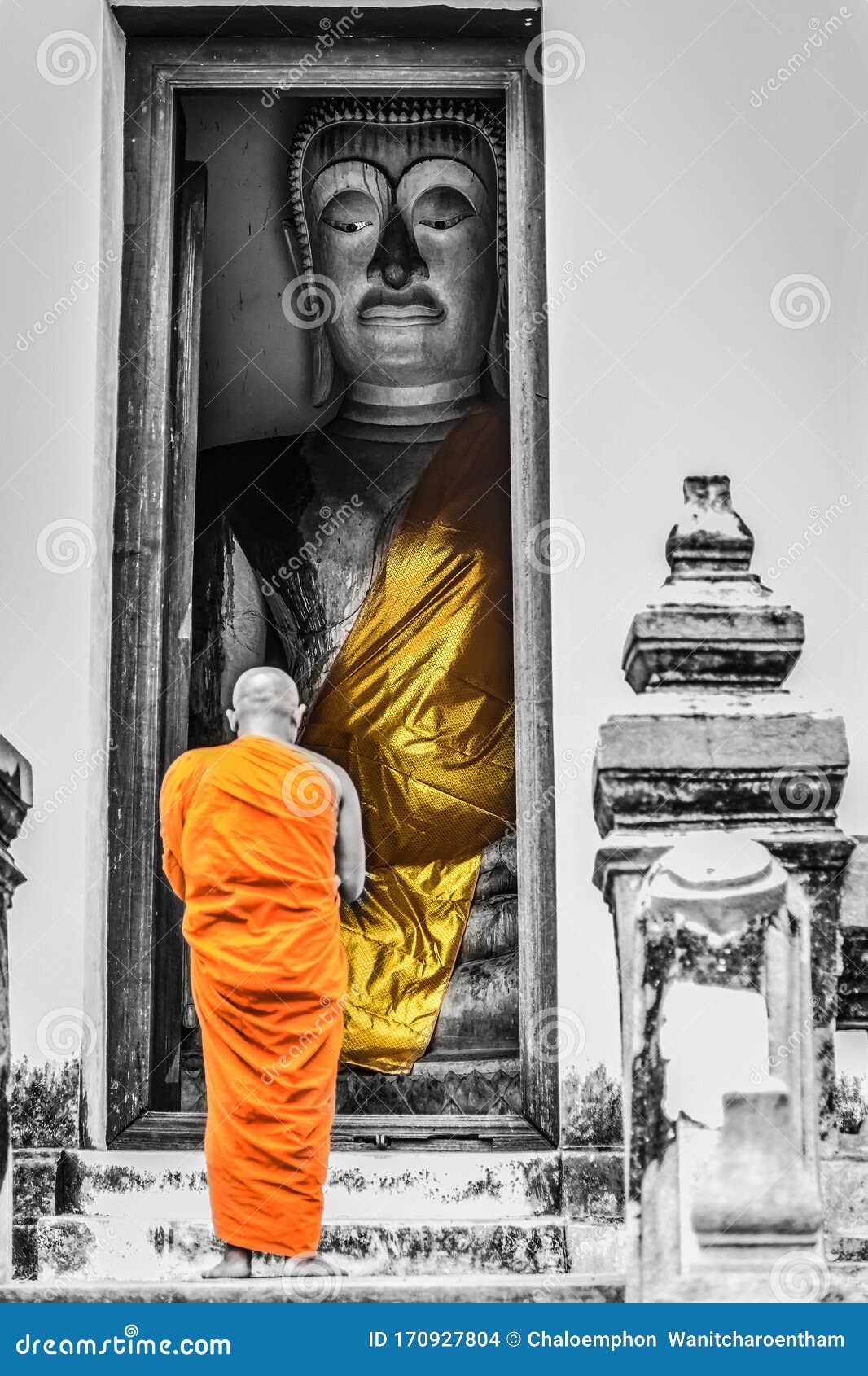 The Monks Stand Meditation in Front of the Church with a Statue of ...