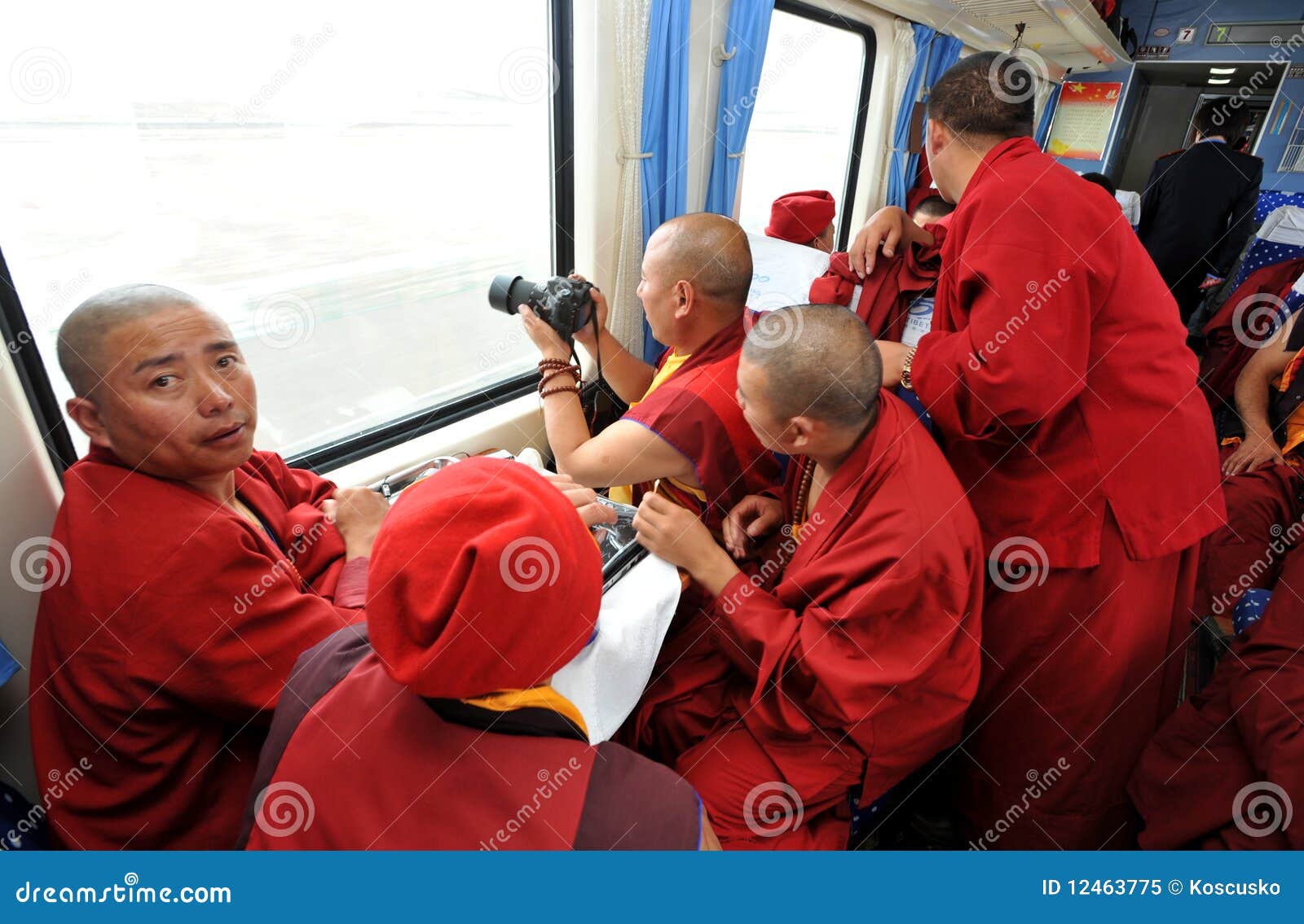 Monks in train editorial image. Image of pass, journey - 12463775