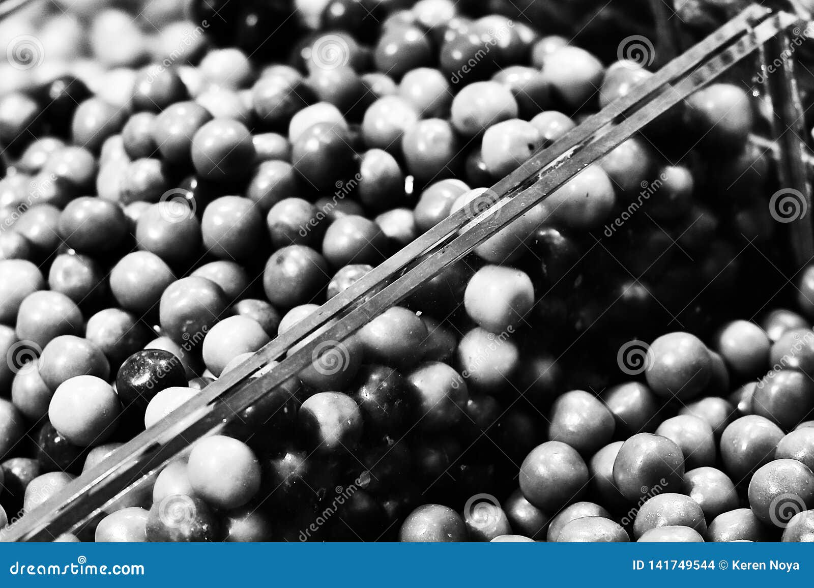 A Monochrome Abstract Background of Tiny Round Objects of Different ...