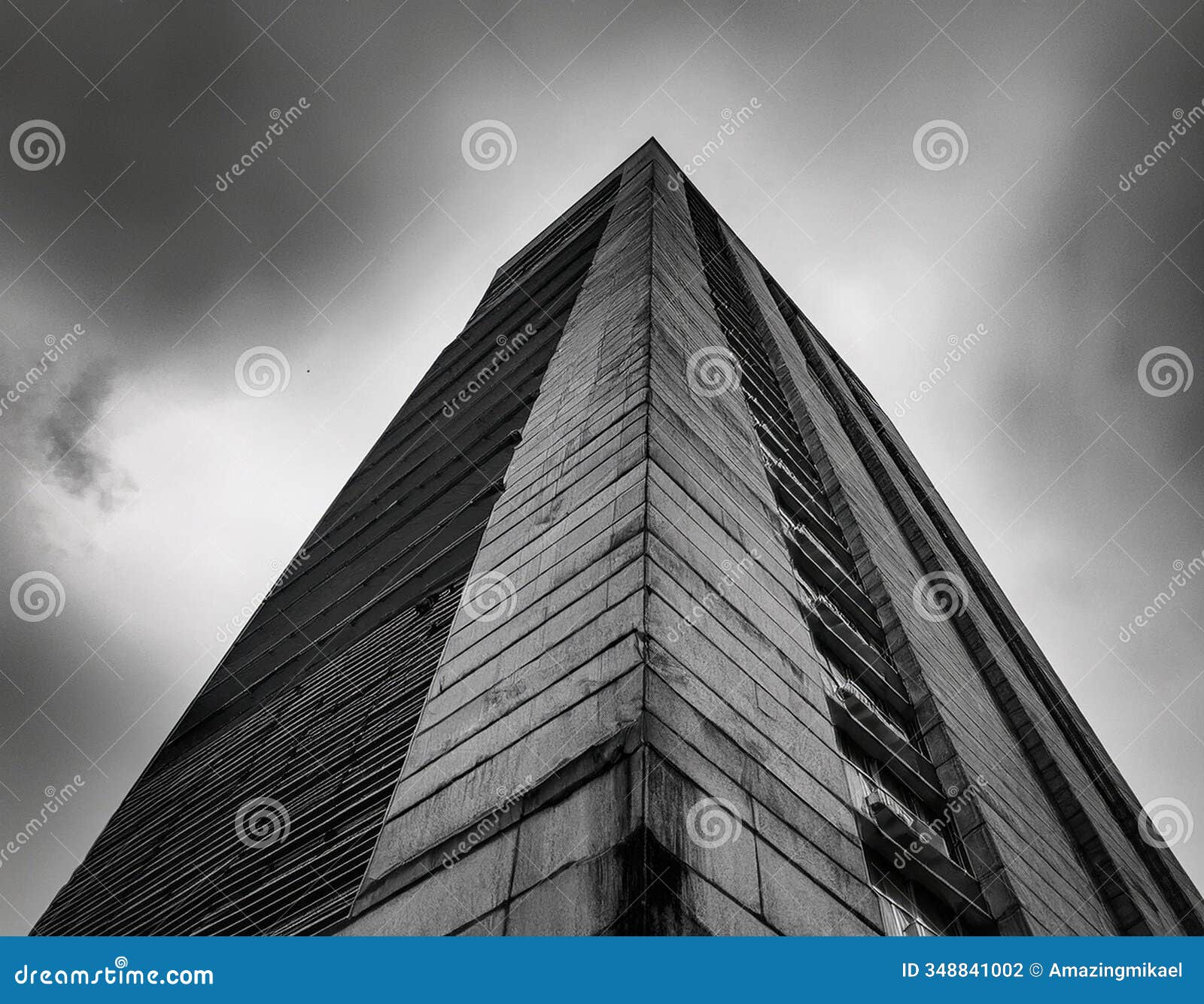 Monochrome Brutalist Tower with Shadows and Ample Sky Stock Photo ...