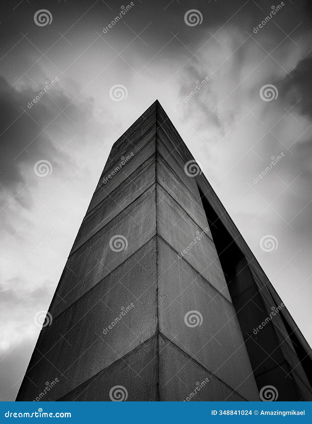 Monochrome Brutalist Tower with Shadows and Ample Sky Stock Photo ...