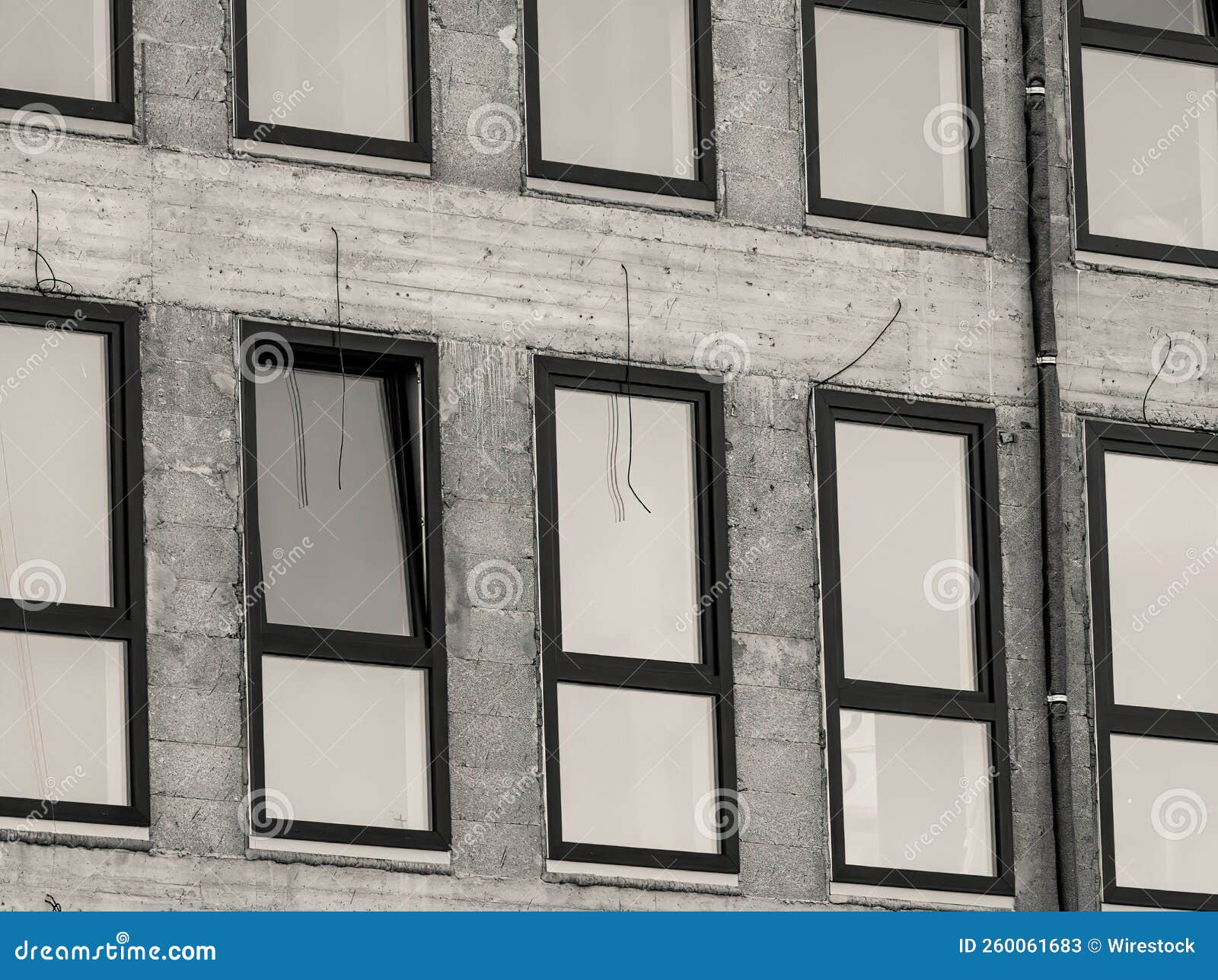 Monochrome Closeup Shot of a Stone Building with Lots of Windows Stock ...