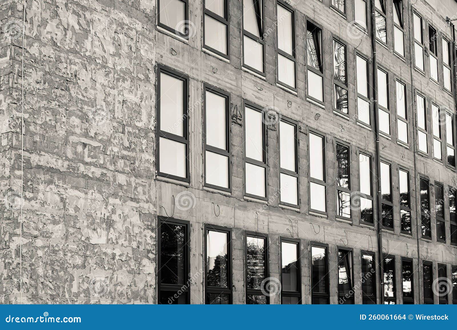 Monochrome Shot of a Stone Building with Lots of Windows Stock Photo ...