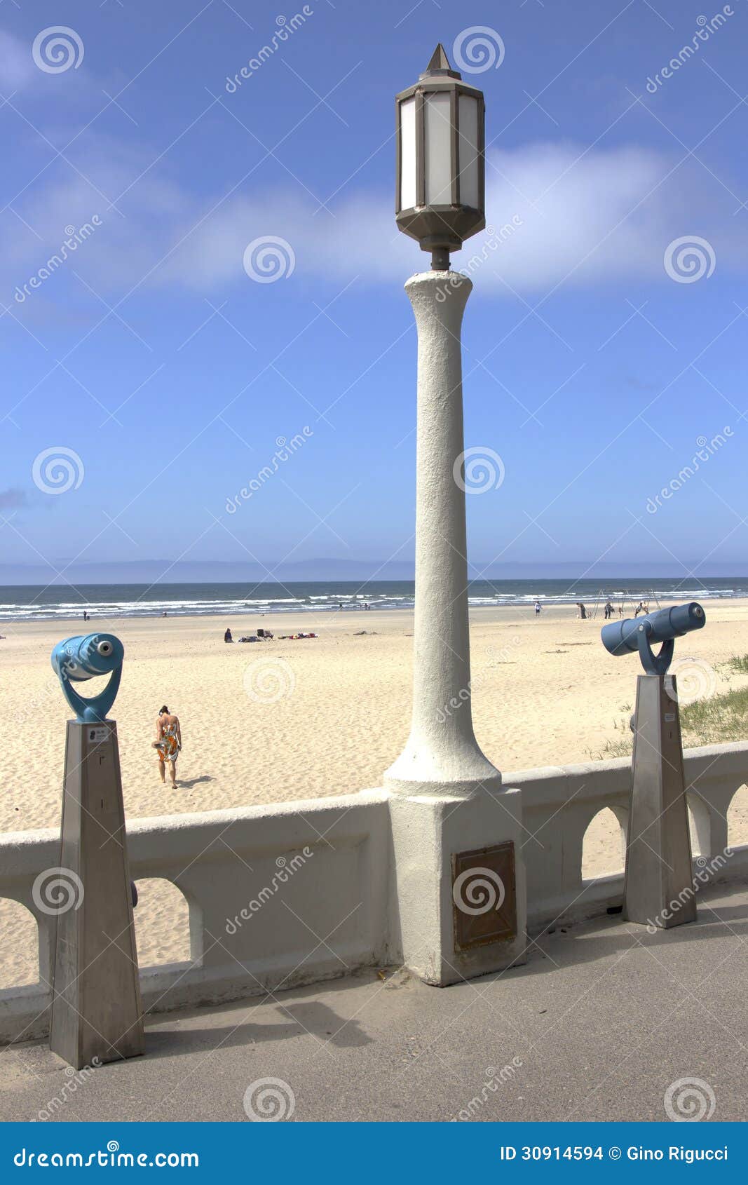 Monoculars and a Light Post Overlooking the Beach. Stock Photo - Image ...