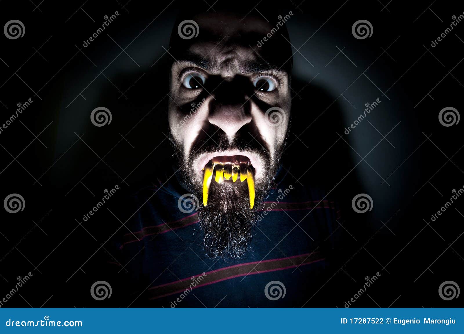 Monstrous Man with Long Teeth Stock Photo - Image of mystery, angry ...