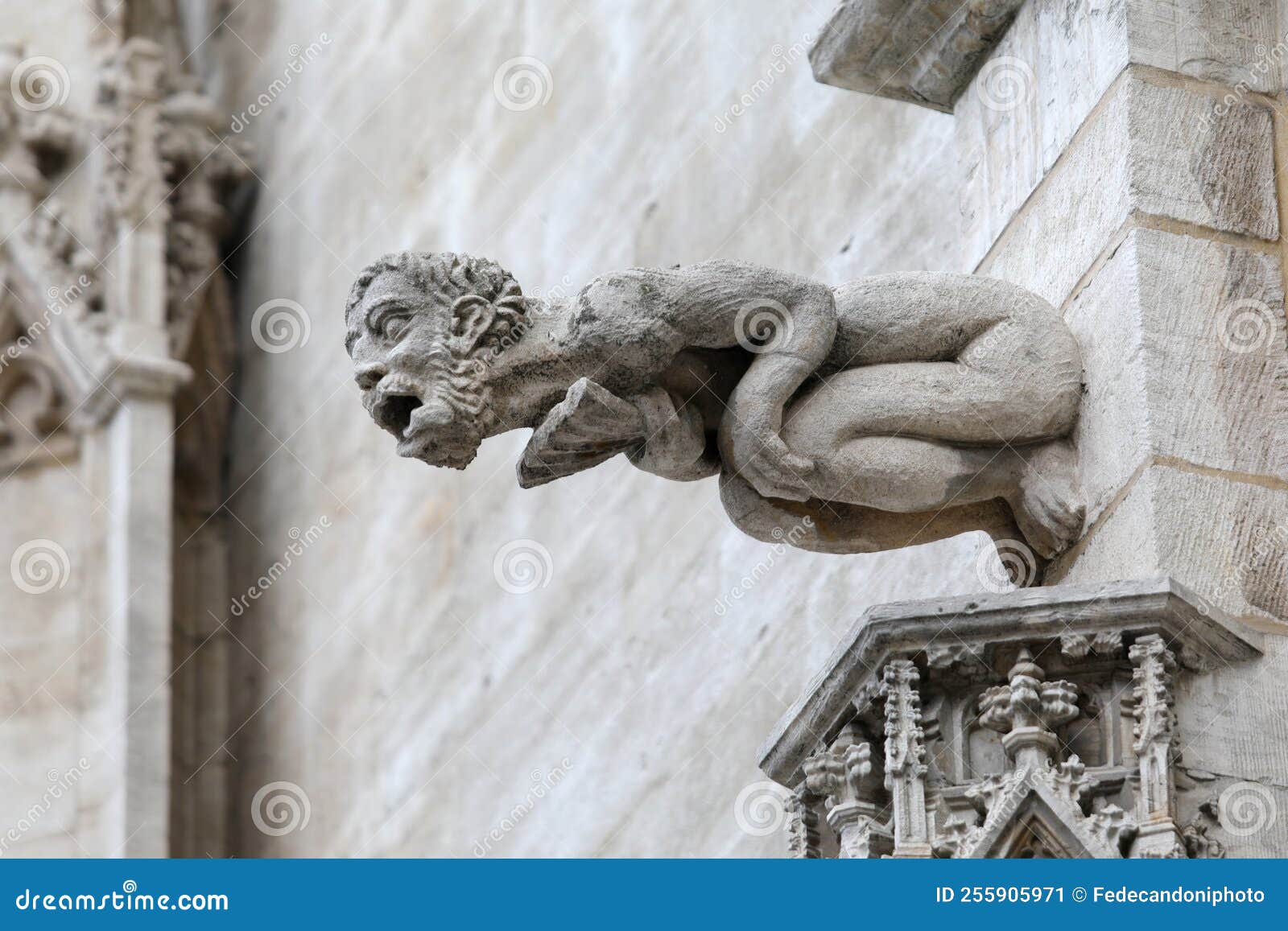 Monstrous Statue with almost Human Features Called Gargoyle on T Stock ...