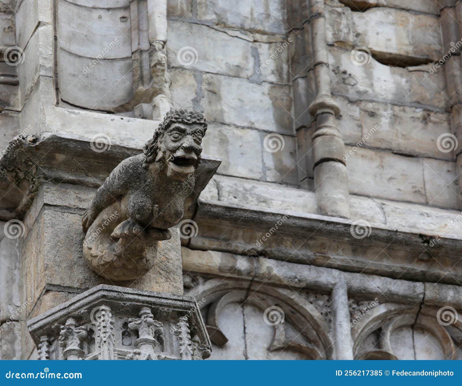 Monstrous Statue with almost Human Features Called Gargoyle on T Stock ...