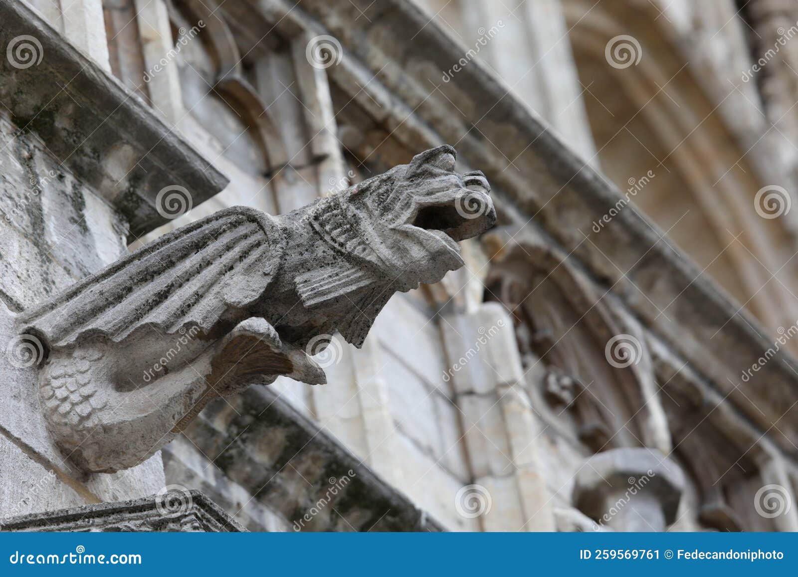 Monstrous Statue with almost Human Features Called Gargoyle on T Stock ...