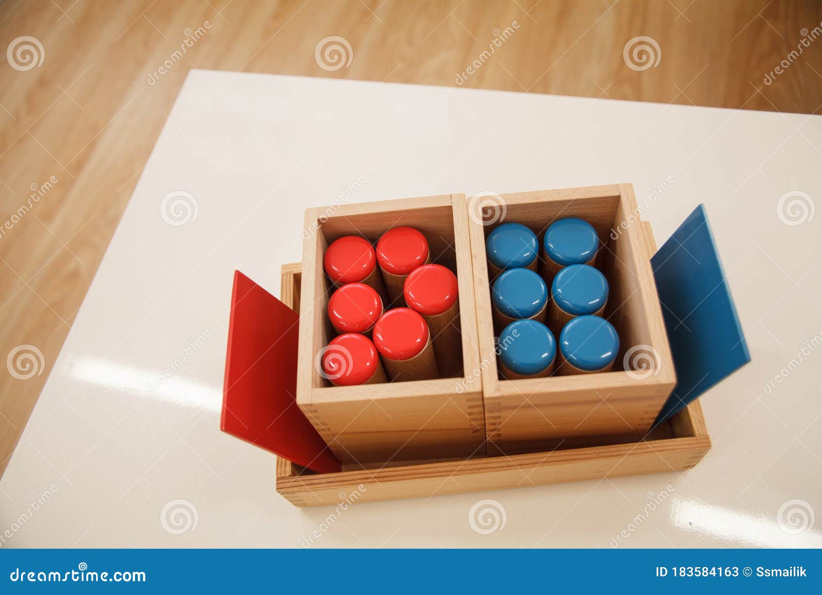 Montessori Material Noisy Cylinders in Classroom. Stock Image - Image ...