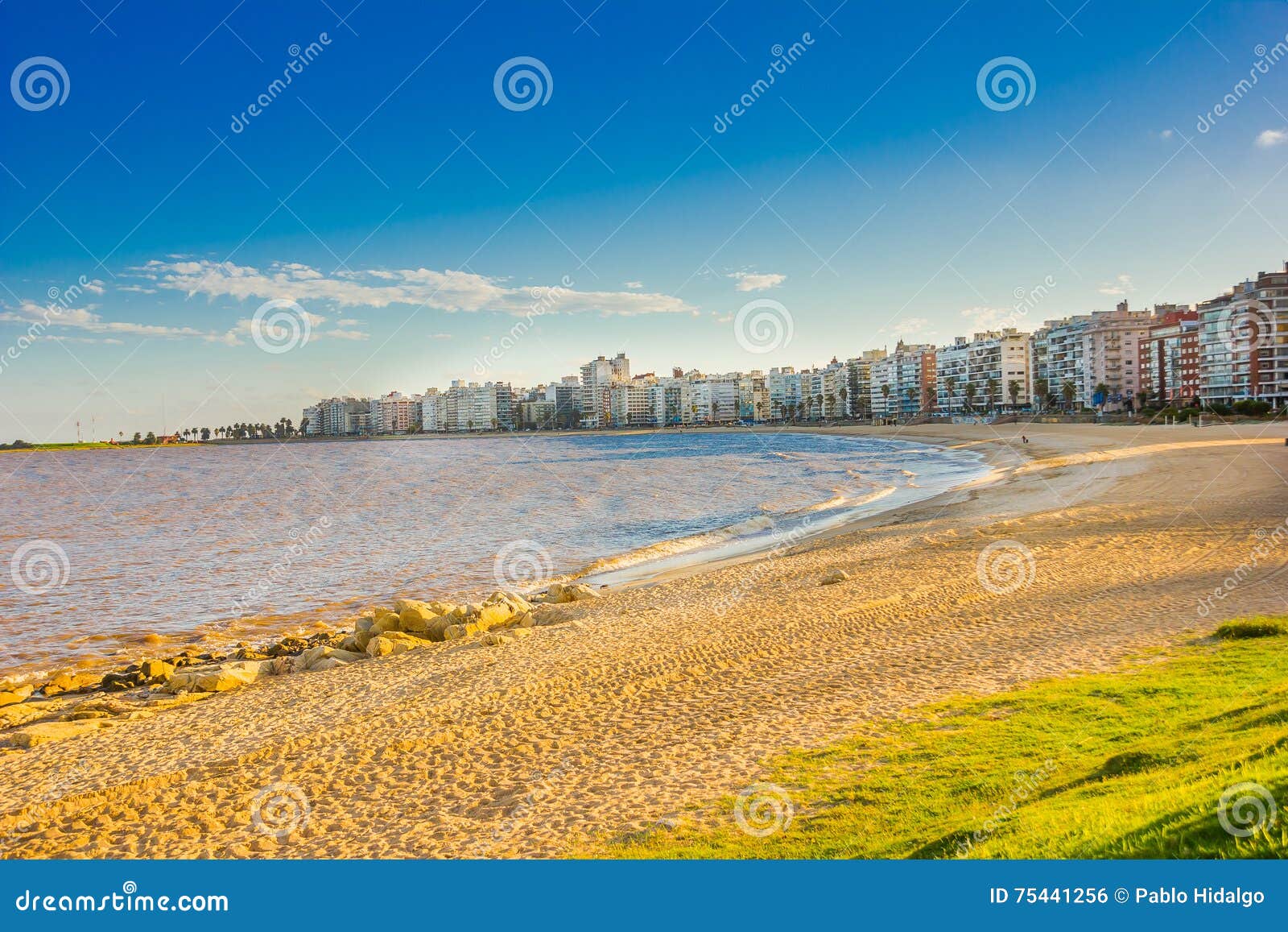 MONTEVIDEO, URUGUAY - MAY 04, 2016: Nice Sunset in the Beach with Some ...