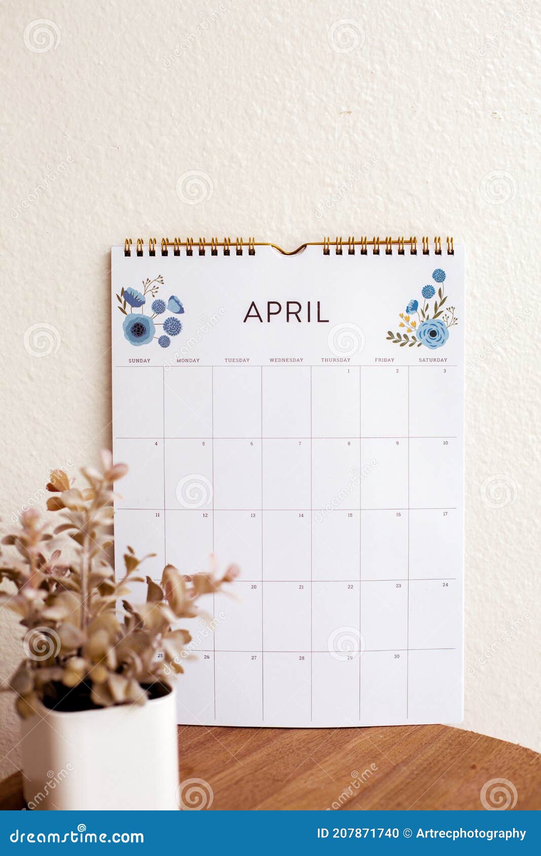 Month of April Calenday Page with Empty Dates on the Table with House ...