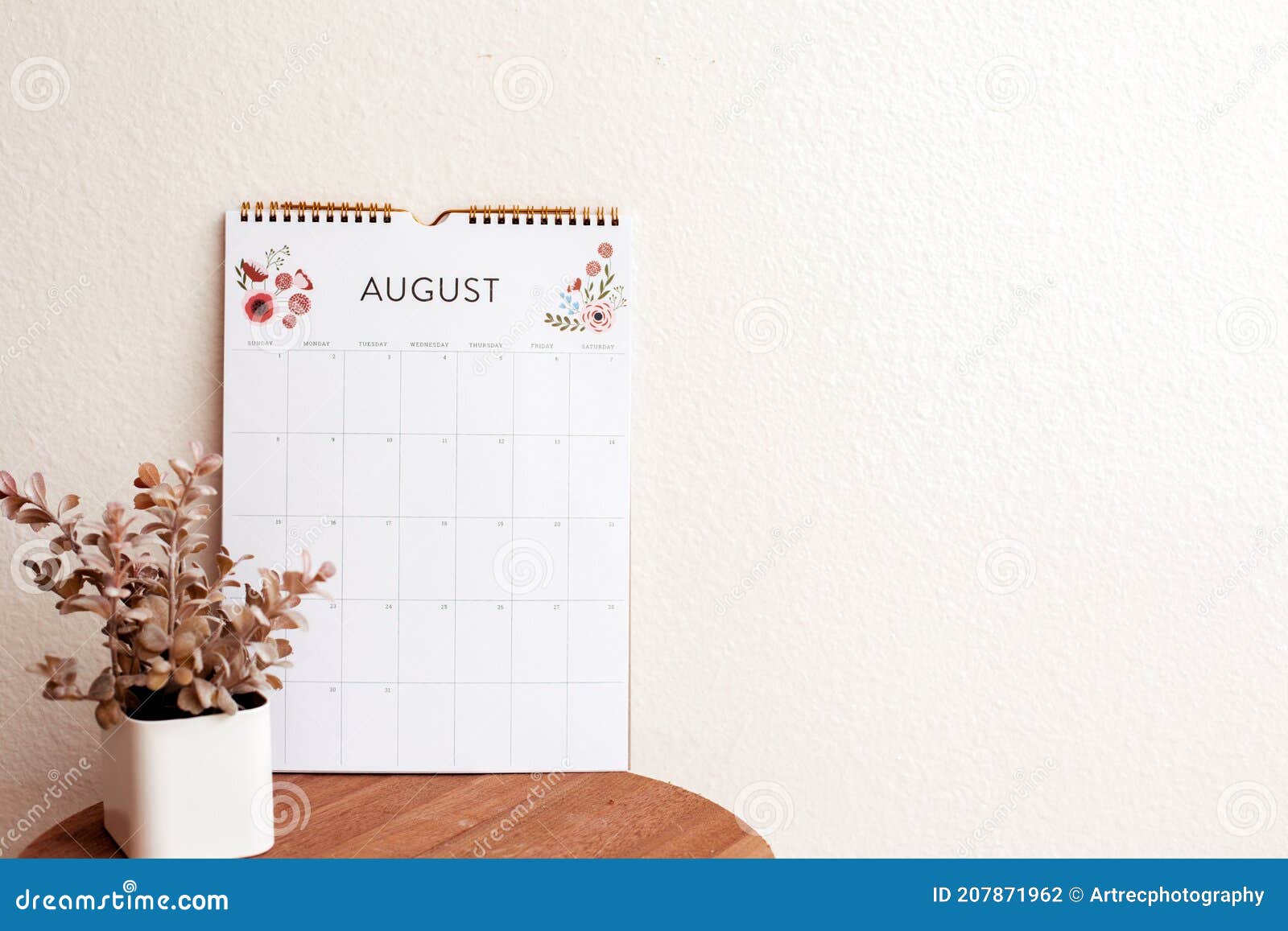 Month of August Calenday Page with Empty Dates on the Table with House ...