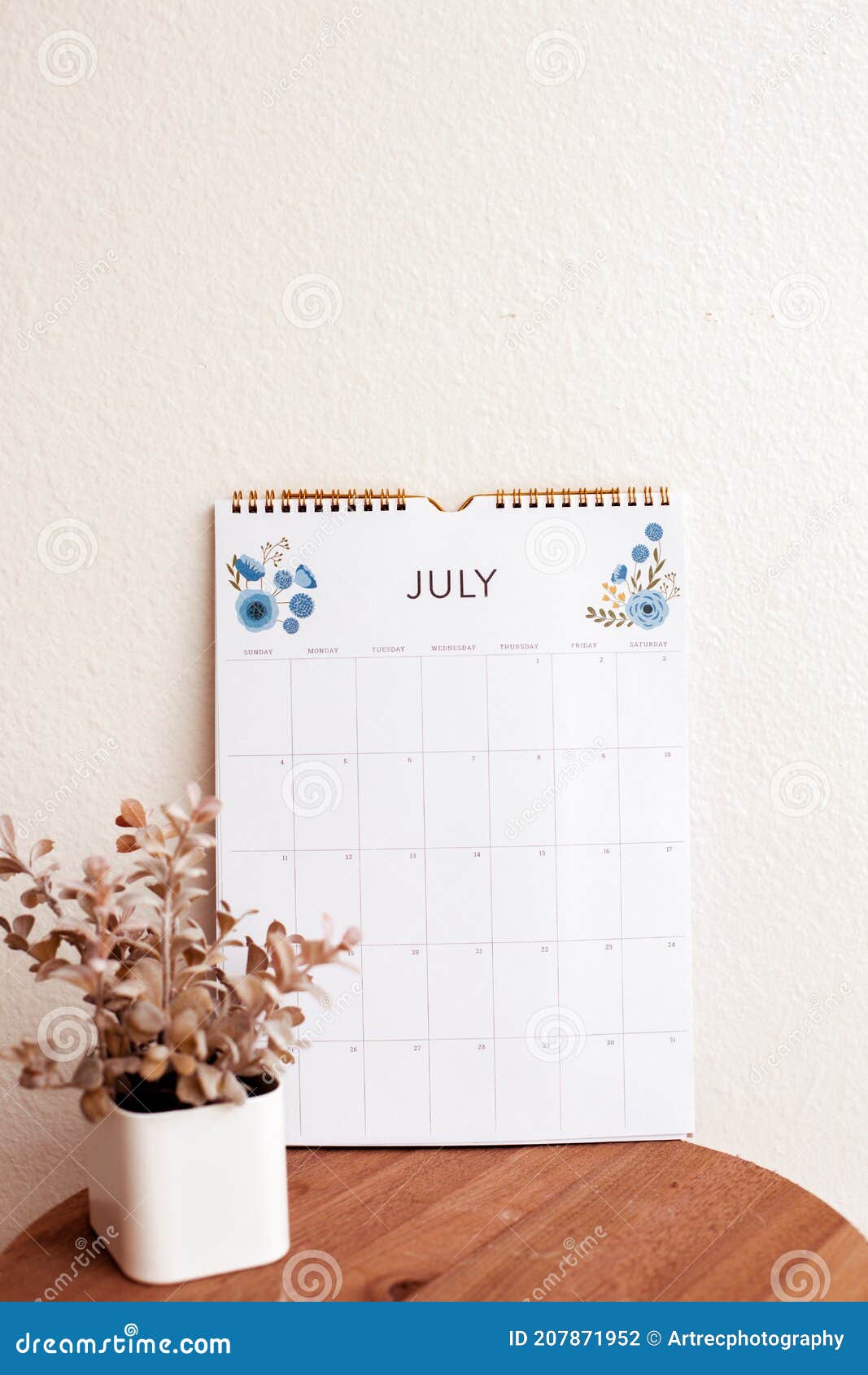 Month of July Calenday Page with Empty Dates on the Table with House ...