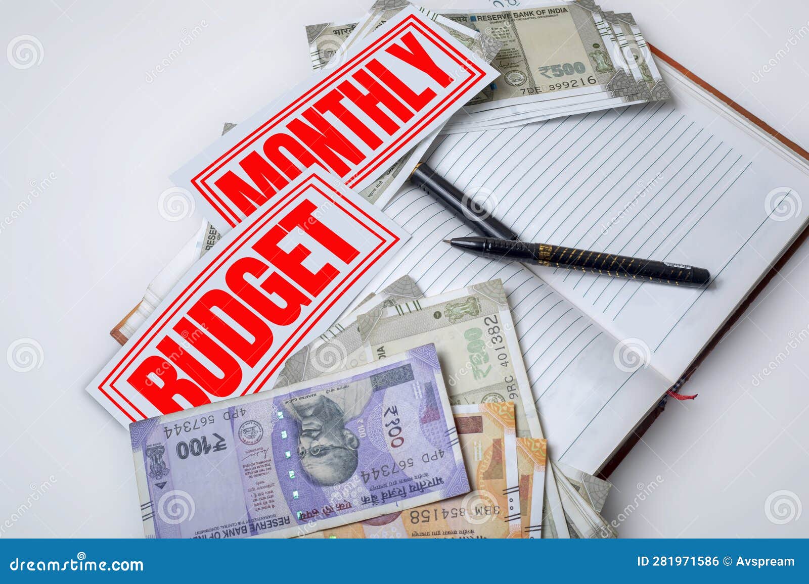 Monthly Budget Planning: Indian Currency Notes with Pen on a Open ...