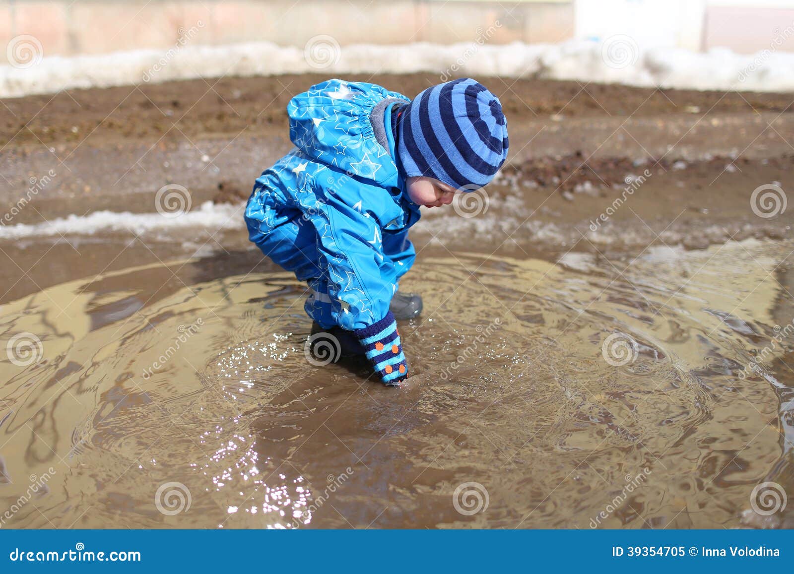 18 Months Baby Playing in Puddle Stock Image - Image of infant, spring ...