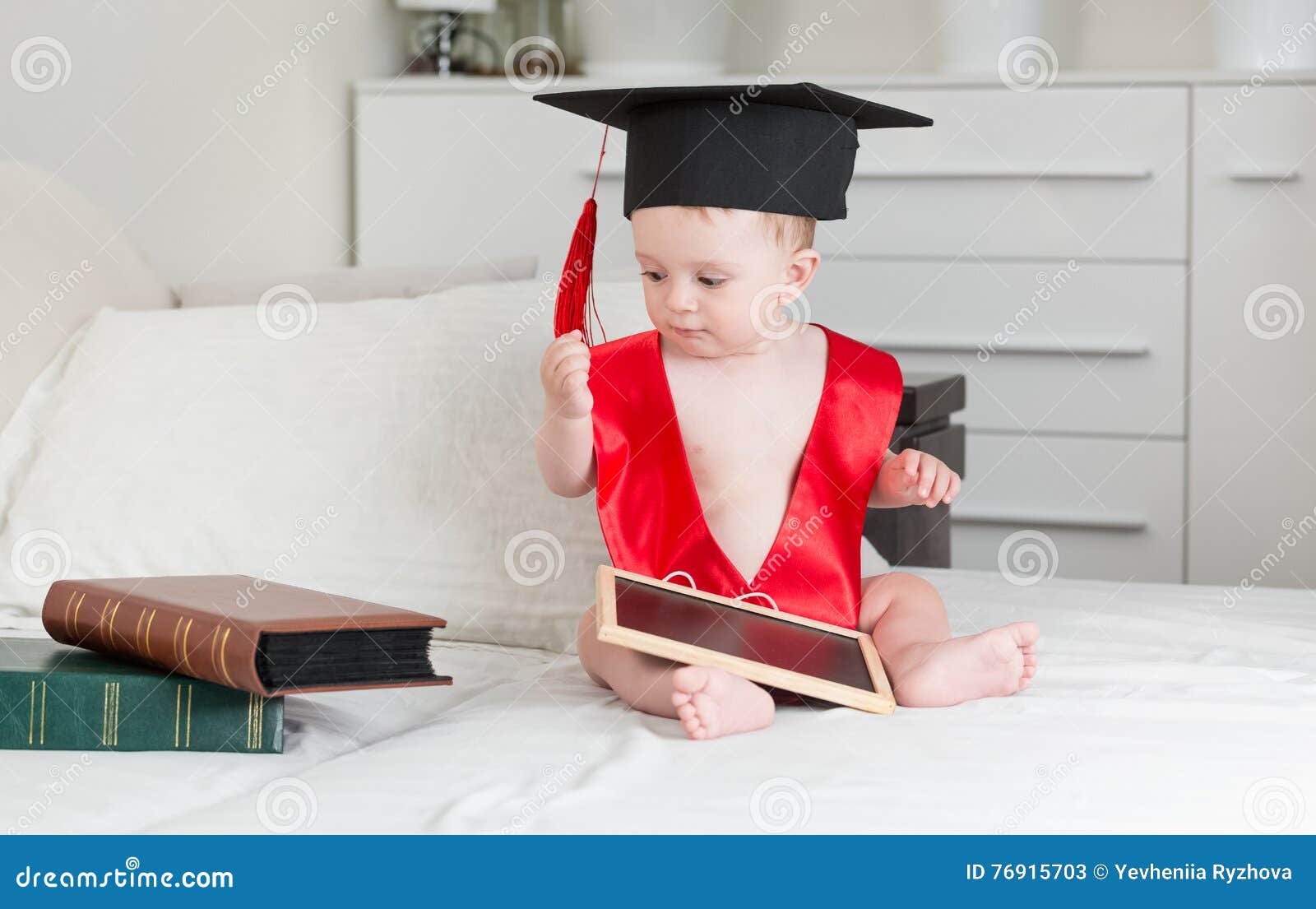 10 Months Old Baby Boy in Graduation Cap Holding Digital Tablet Stock ...