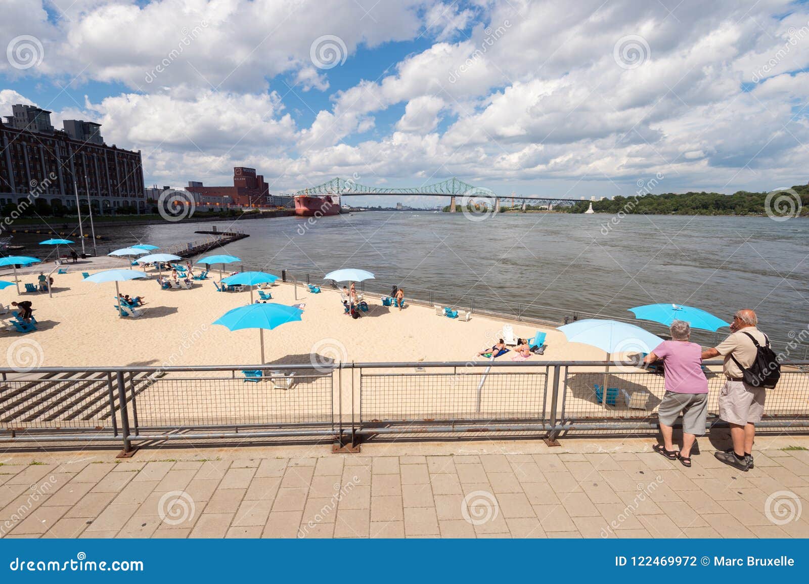 Clock Tower Beach in the Old Port of Montreal Editorial Photography ...