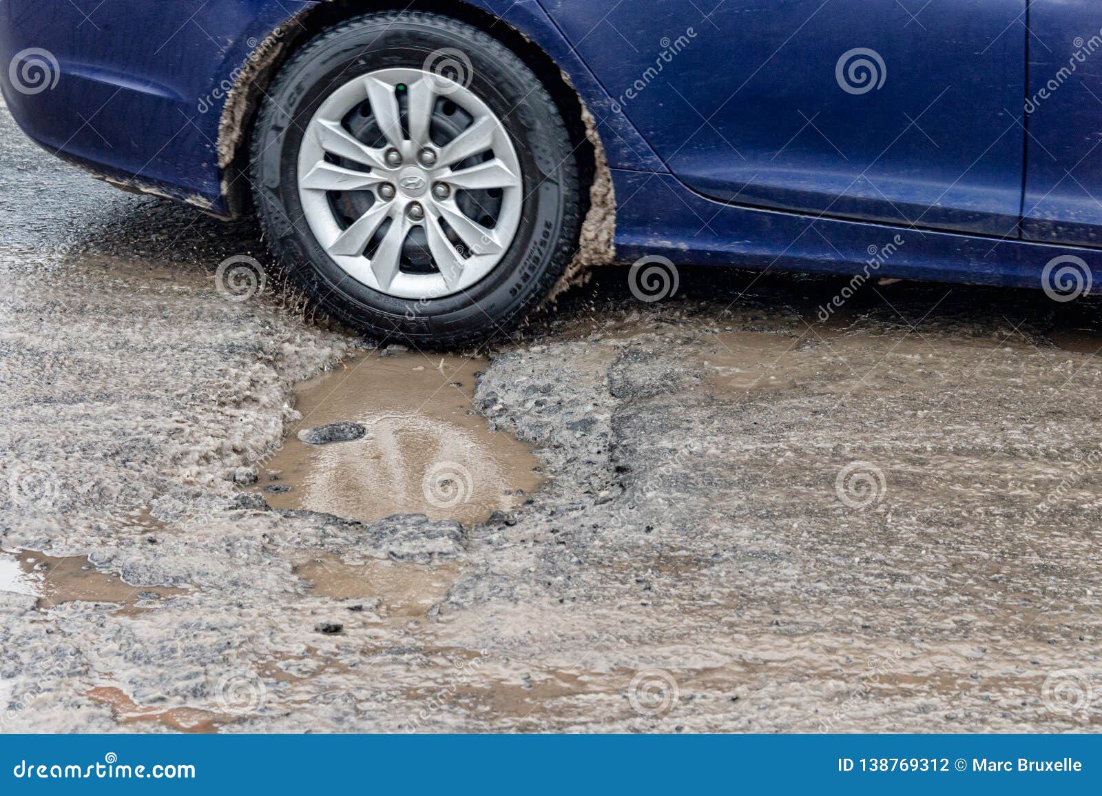 Car Driving through a Pothole, Montreal, Canada Editorial Photography ...