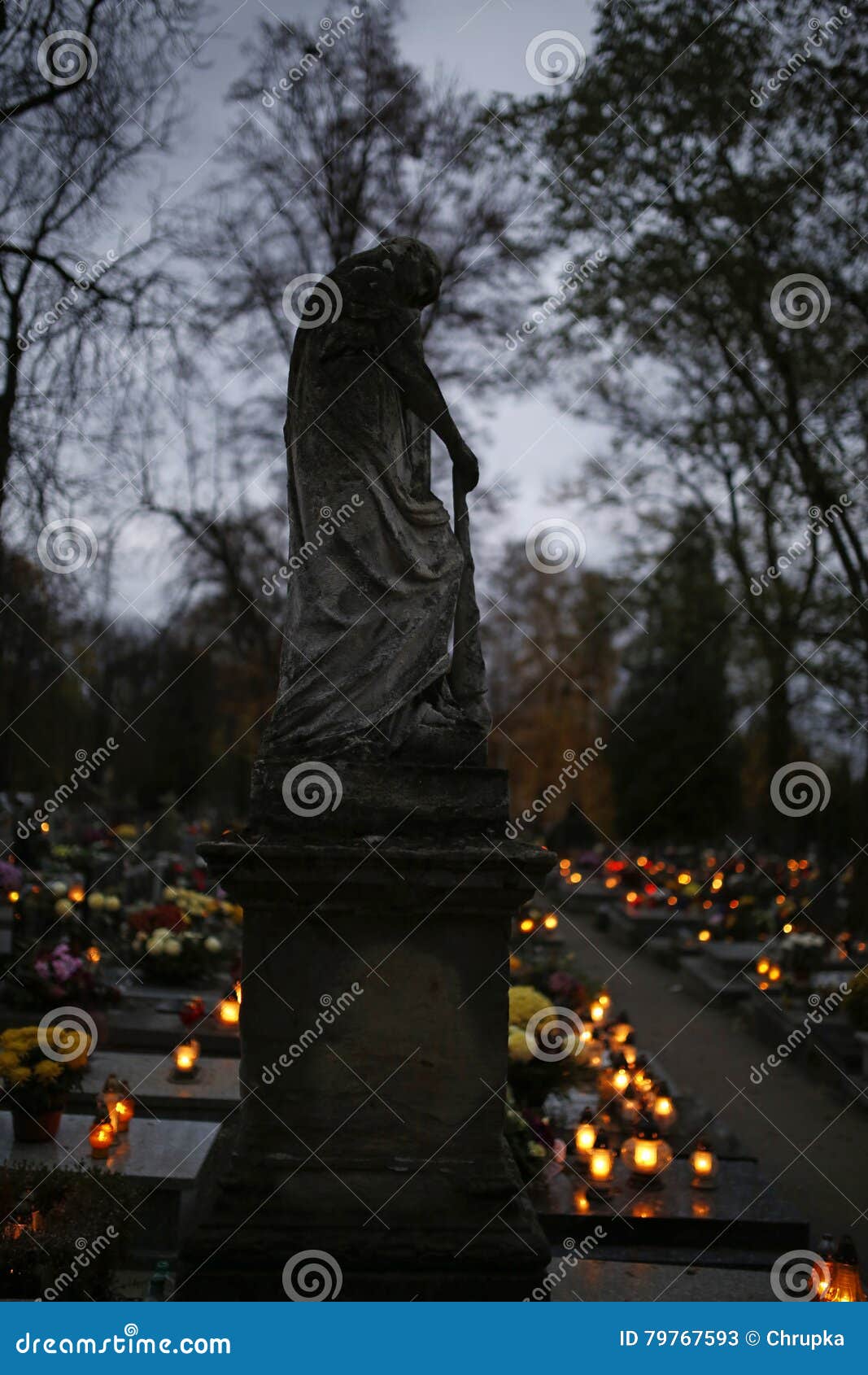Monument and Burning Candles at the Cemetery on All Saints Stock Image ...