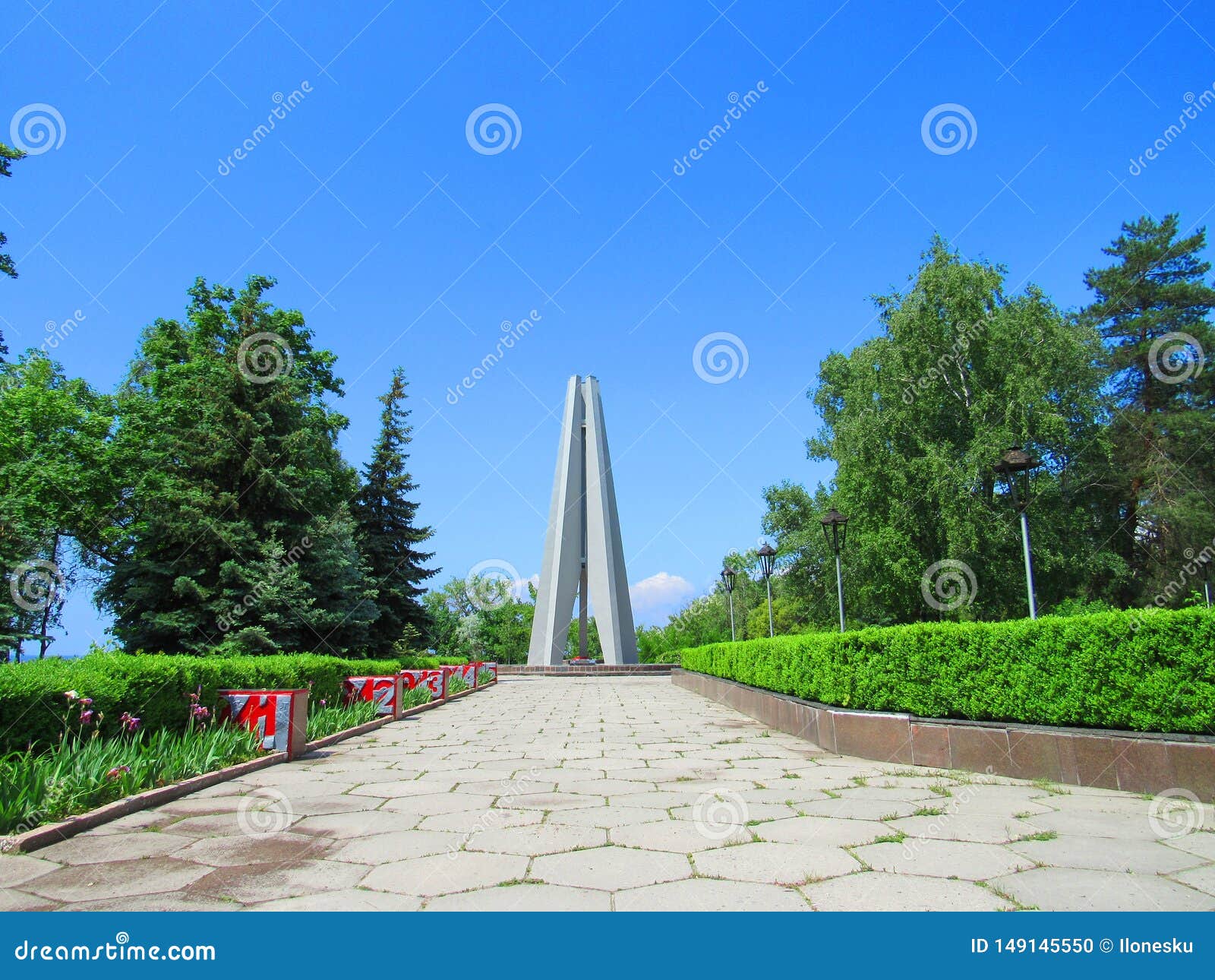 Monument - An Eternal Flame With A Blazing Flame Inside A Concrete Slab ...