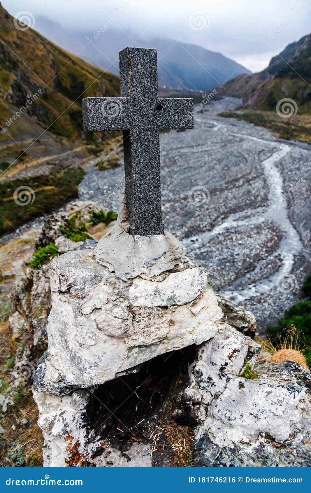 Monument with a Large Stone Cross on Top of a Mountain Overlooking ...