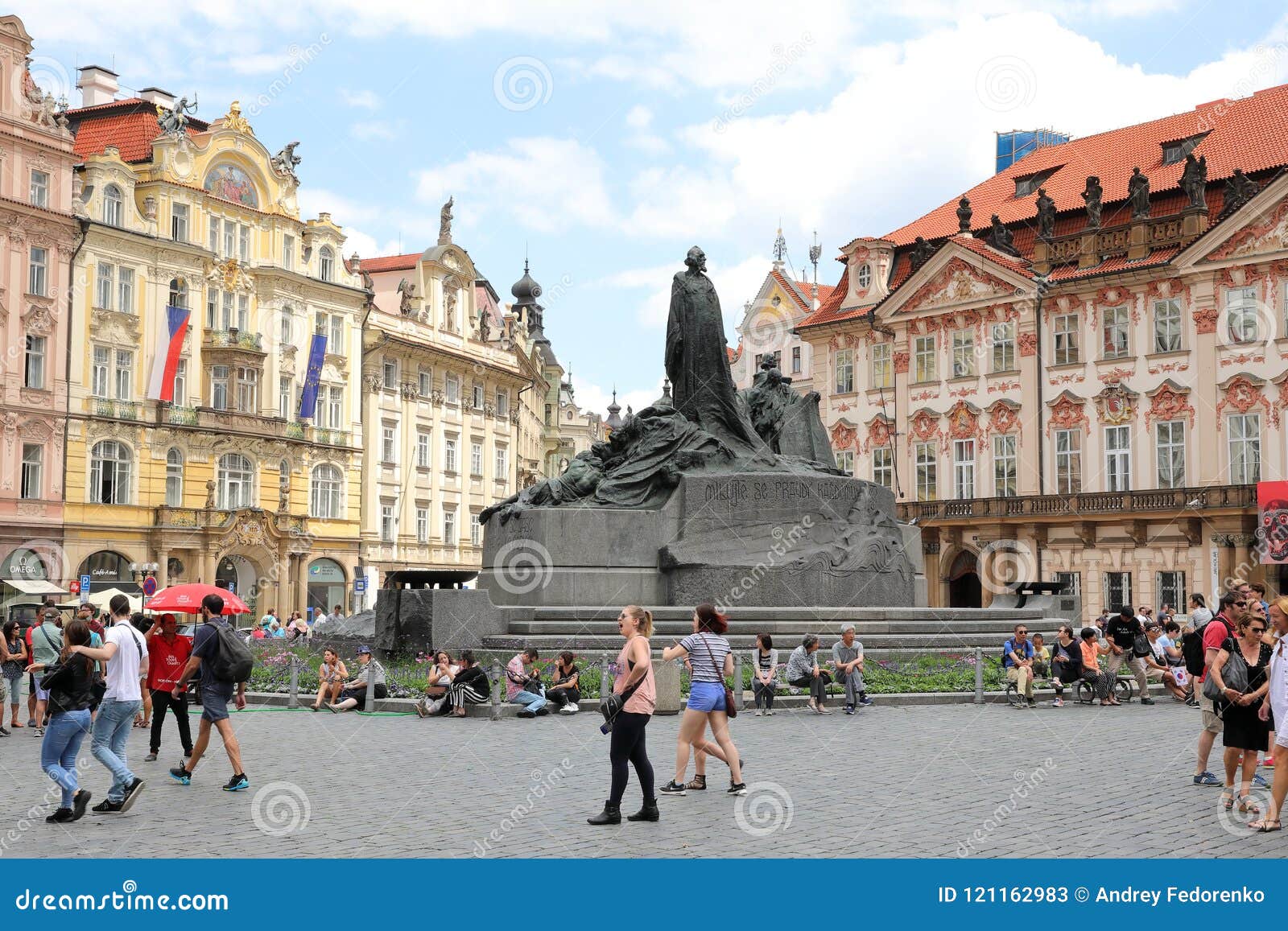Monument on the Square of Old Prague Surrounded by Tourists. Editorial ...