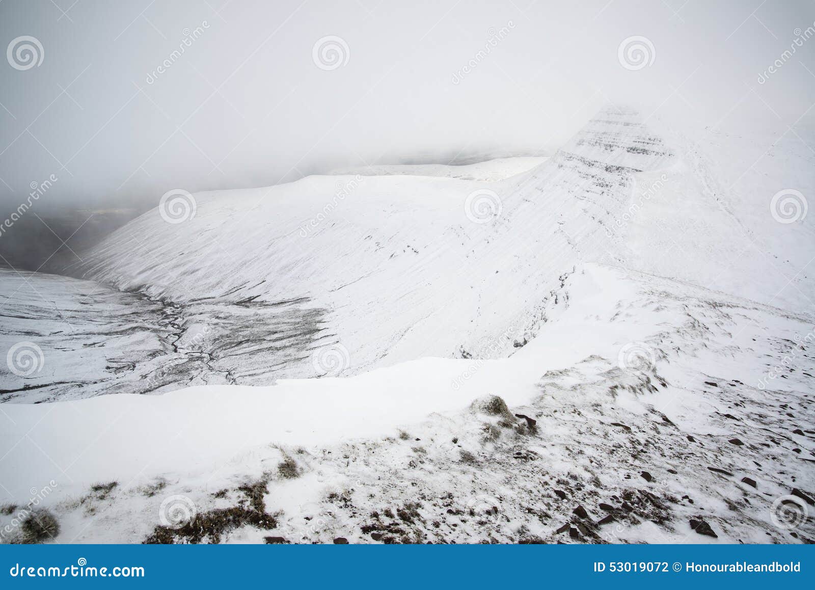 Moody Dramatic Low Cloud Winter Landscape in Mountains with Snow Stock ...