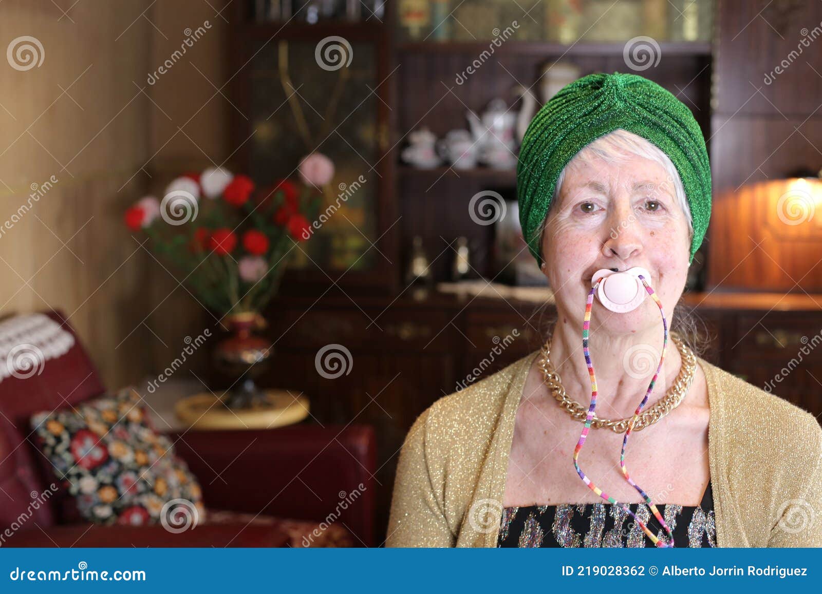 Moody Senior Woman Using a Pacifier Stock Photo - Image of mouth ...