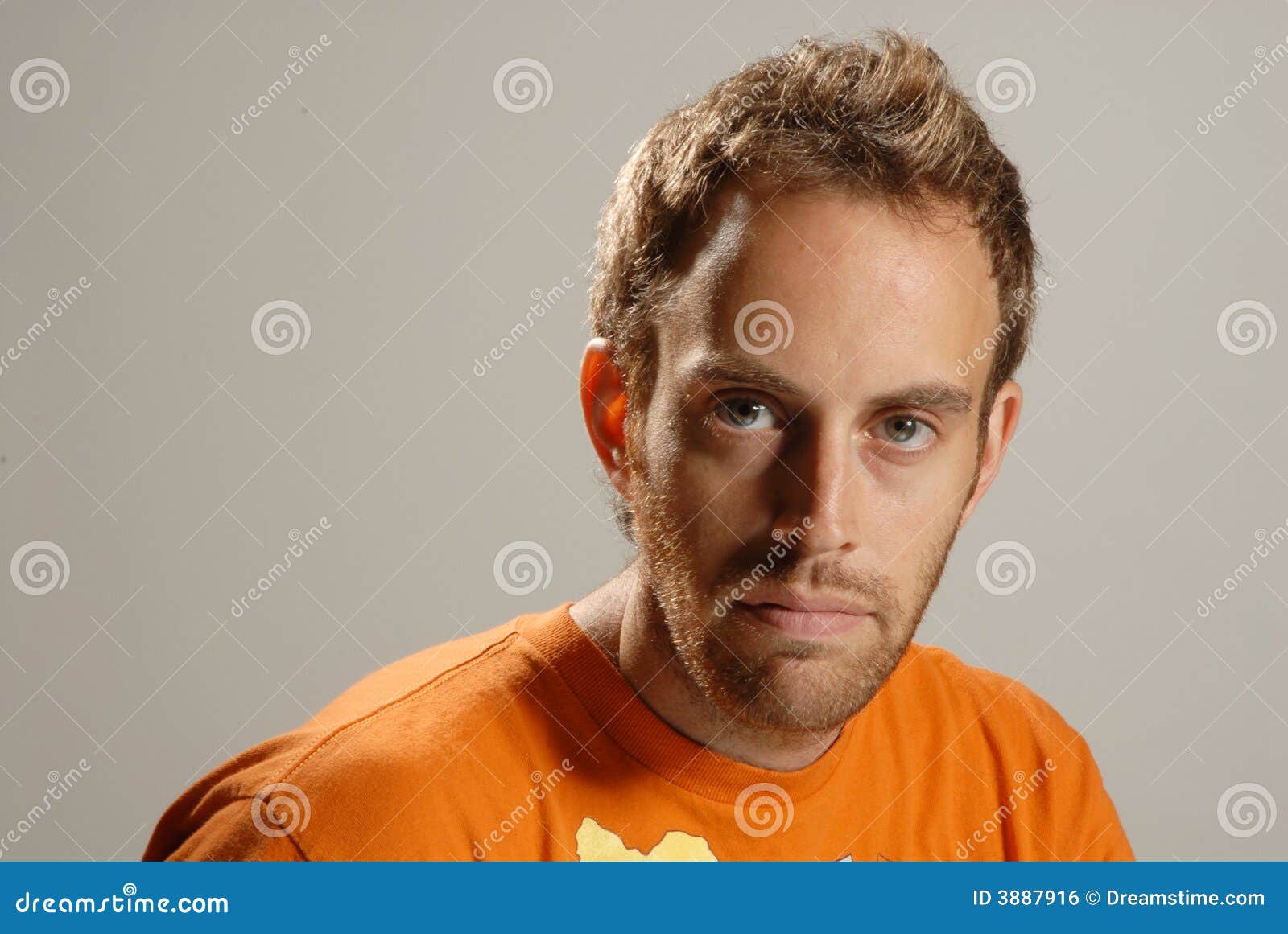 Moody young man stock photo. Image of beard, expression - 3887916
