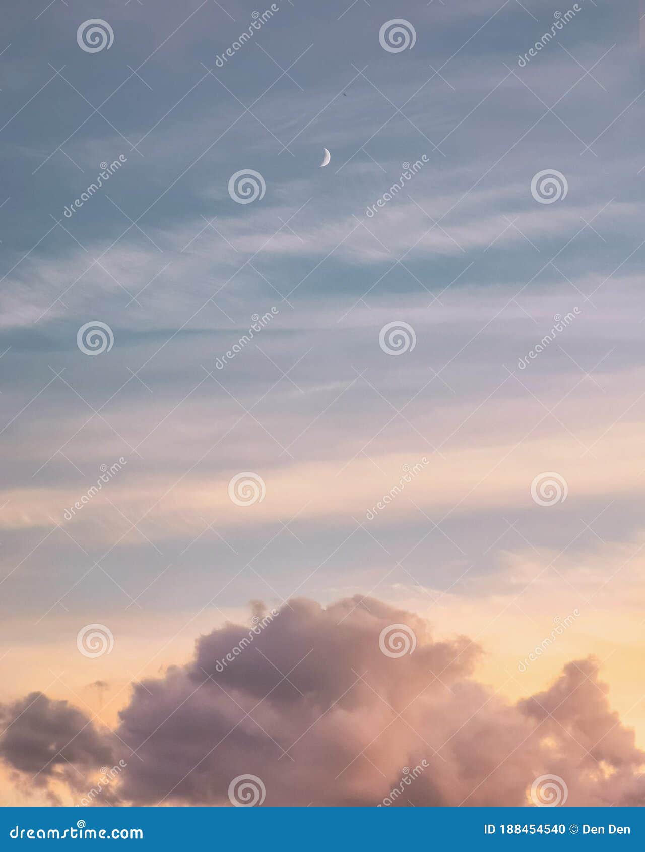 The Moon Above the Clouds at Sunset Stock Photo - Image of sunset ...