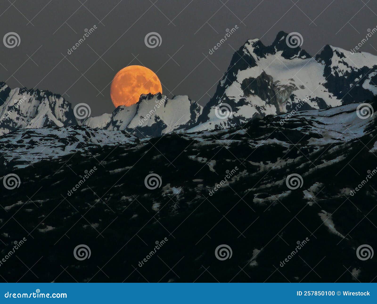 Moon Behind the Snowy Mountains in Alaska Stock Photo - Image of harbor ...