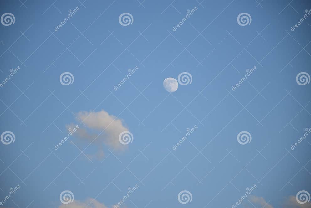 Moon in the blue sky stock photo. Image of celestial - 96321200