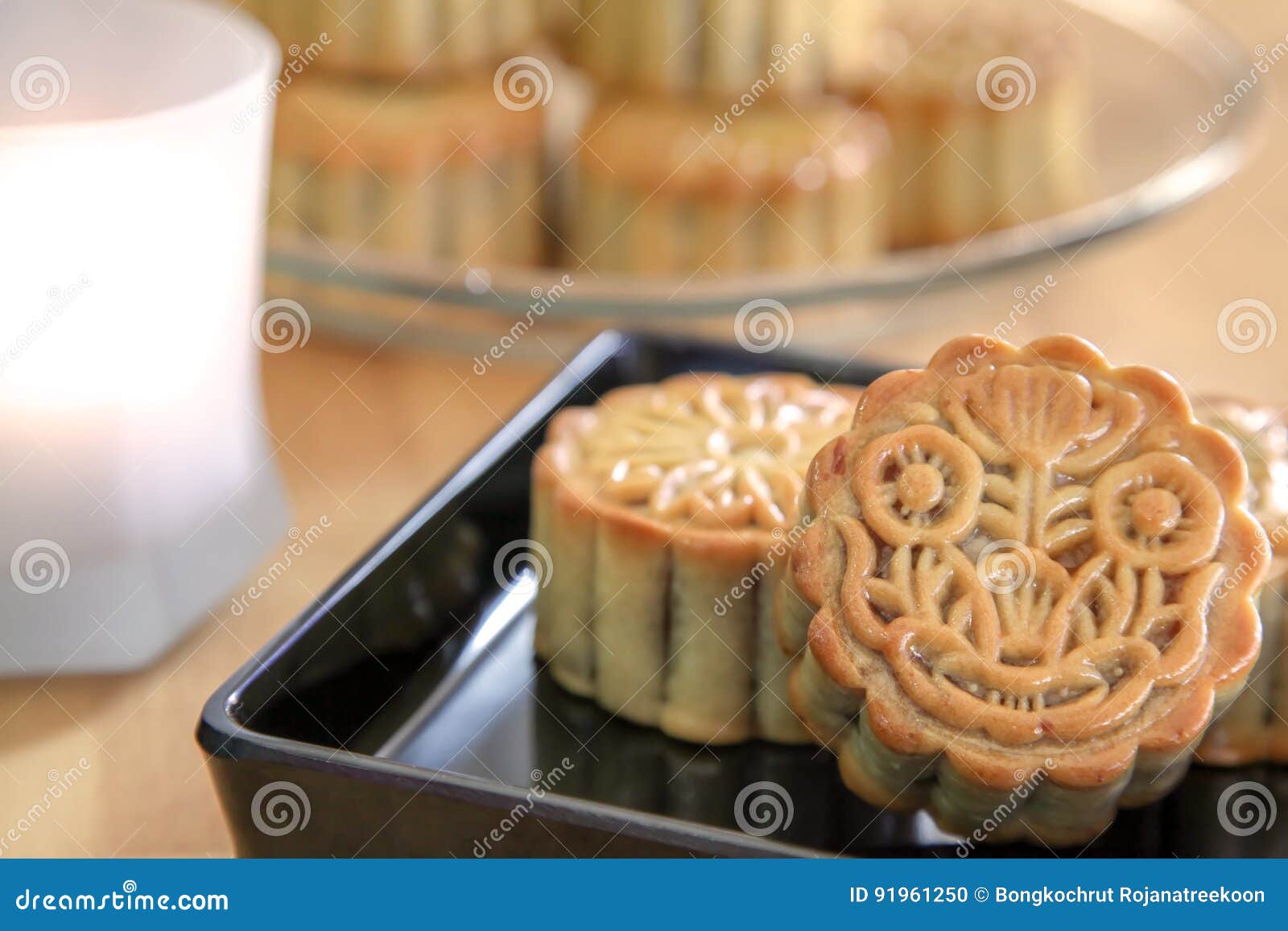 Moon Cakes And A Yellow Chrysanthemum On The Table.Chinese Characters ...