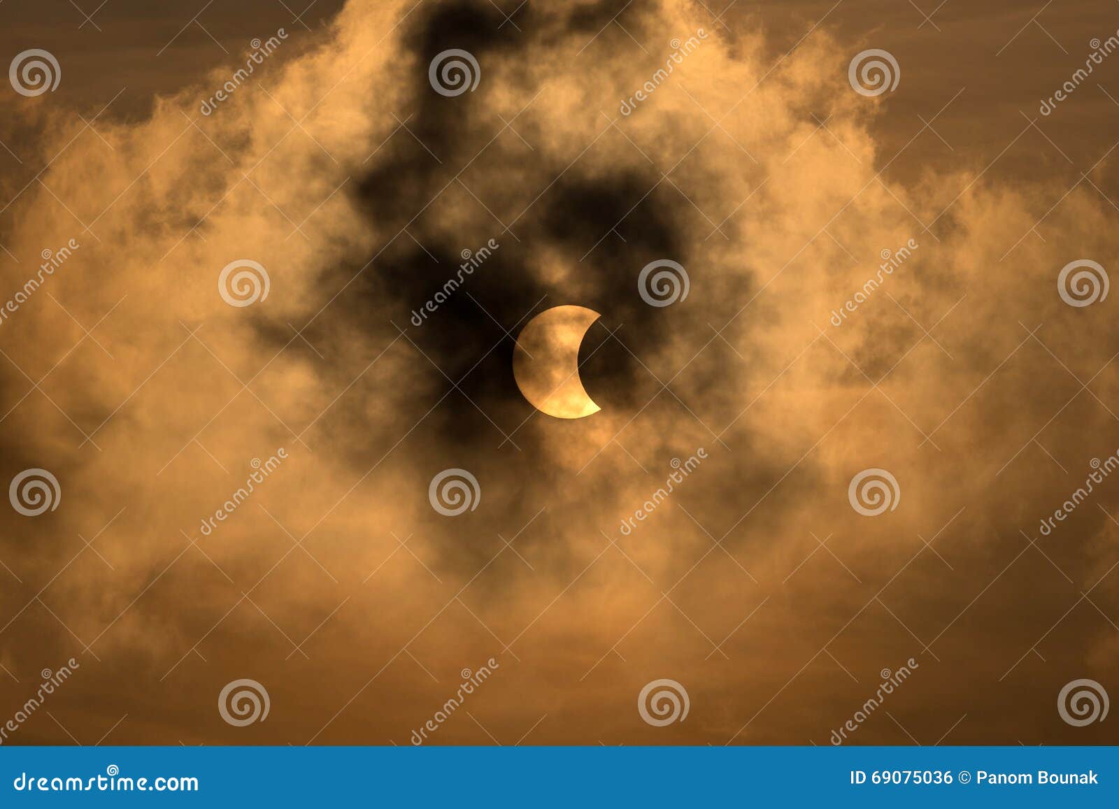 The Moon Covering the Sun in a Partial Eclipse Stock Photo - Image of ...