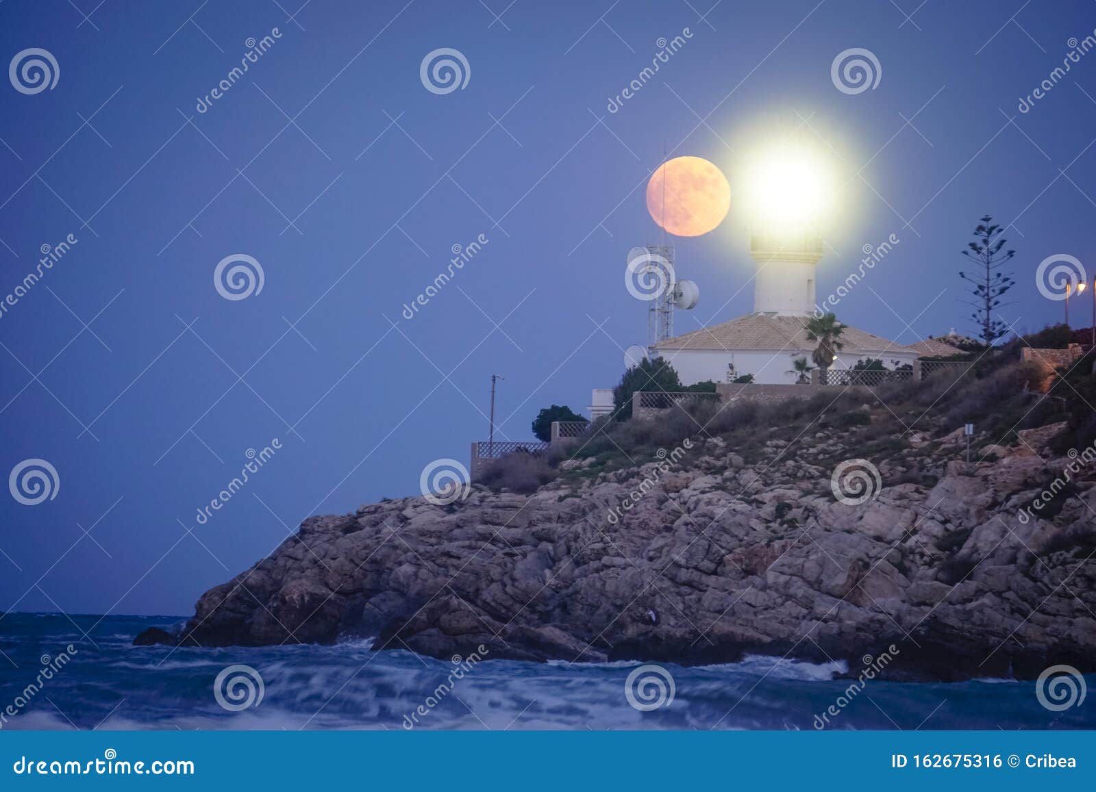 Moon Eclipse Over a Lighthouse on the Coast Stock Photo - Image of fife ...